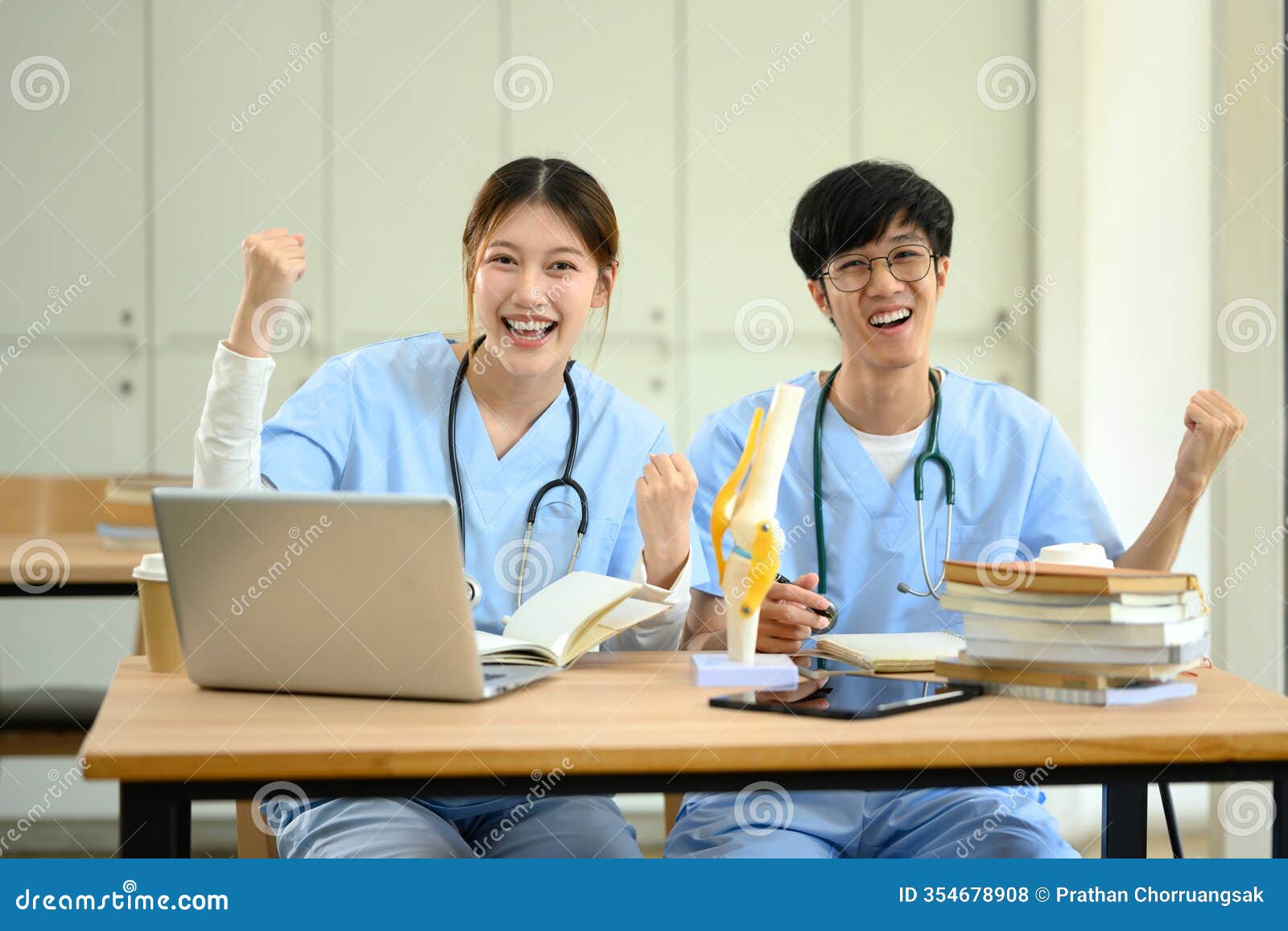 Excited Medical Students Celebrating Success in Study Stock Photo ...