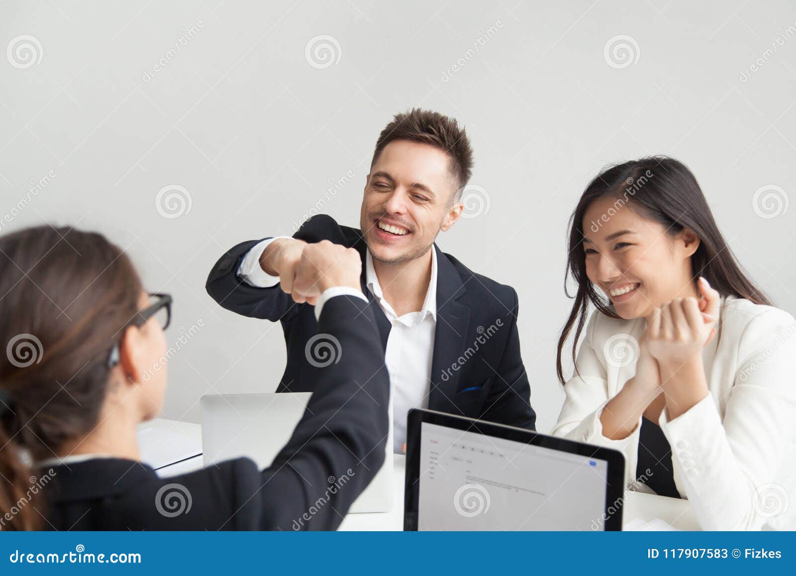 Excited Multi-ethnic Colleagues Giving Fist Bump Celebrating Goo Stock ... Excited Multi-ethnic Colleagues Giving Fist Bump Celebrating Goo Stock ...