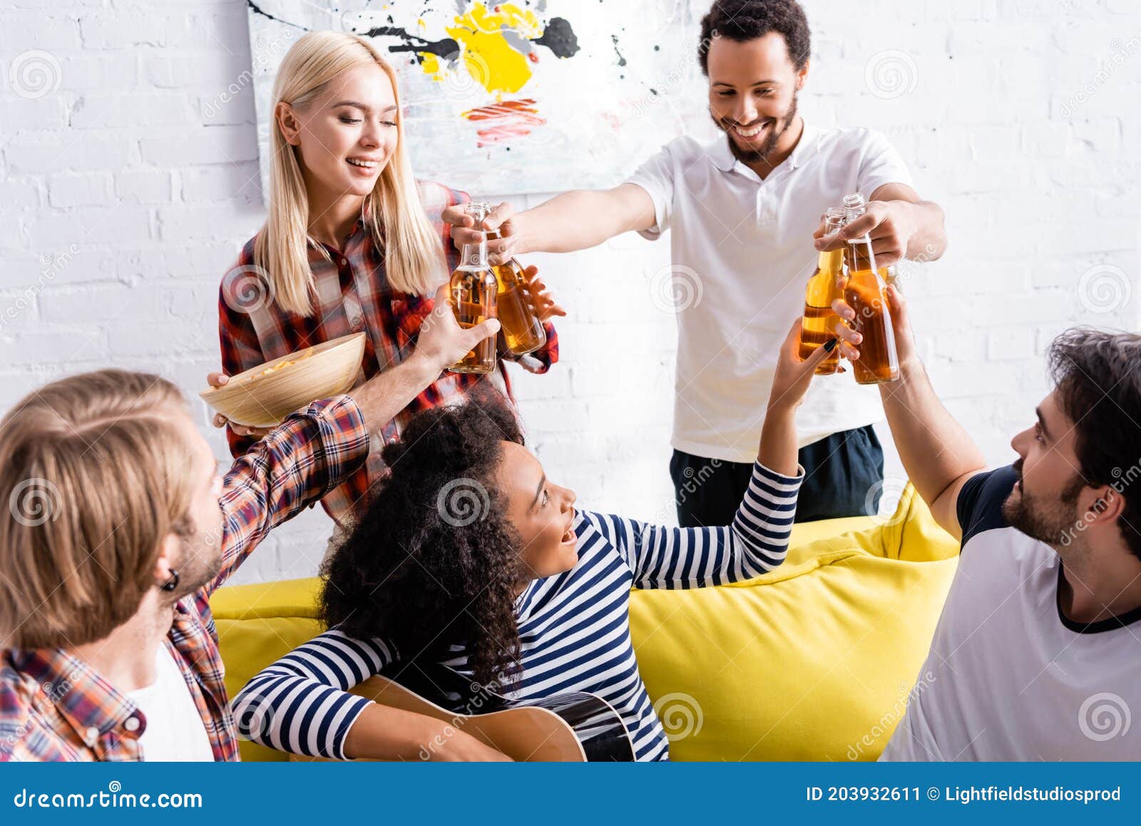 Excited Multiethnic Friends Clinking Bottles of Stock Image - Image of ... Excited Multiethnic Friends Clinking Bottles of Stock Image - Image of ...