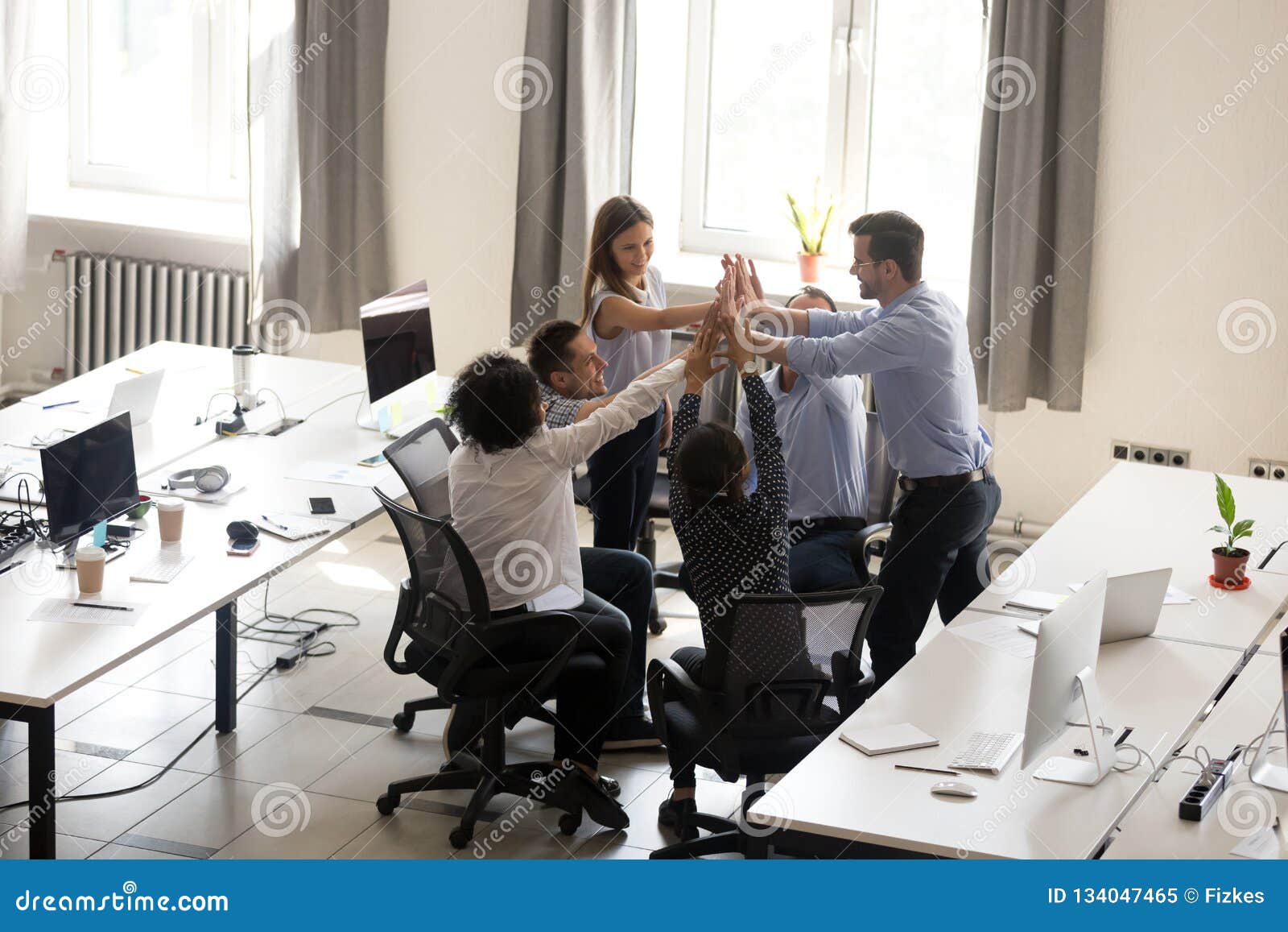Multiracial Office Workers Looking At Laptop. Stock Photography ... Multiracial Office Workers Looking At Laptop. Stock Photography ...