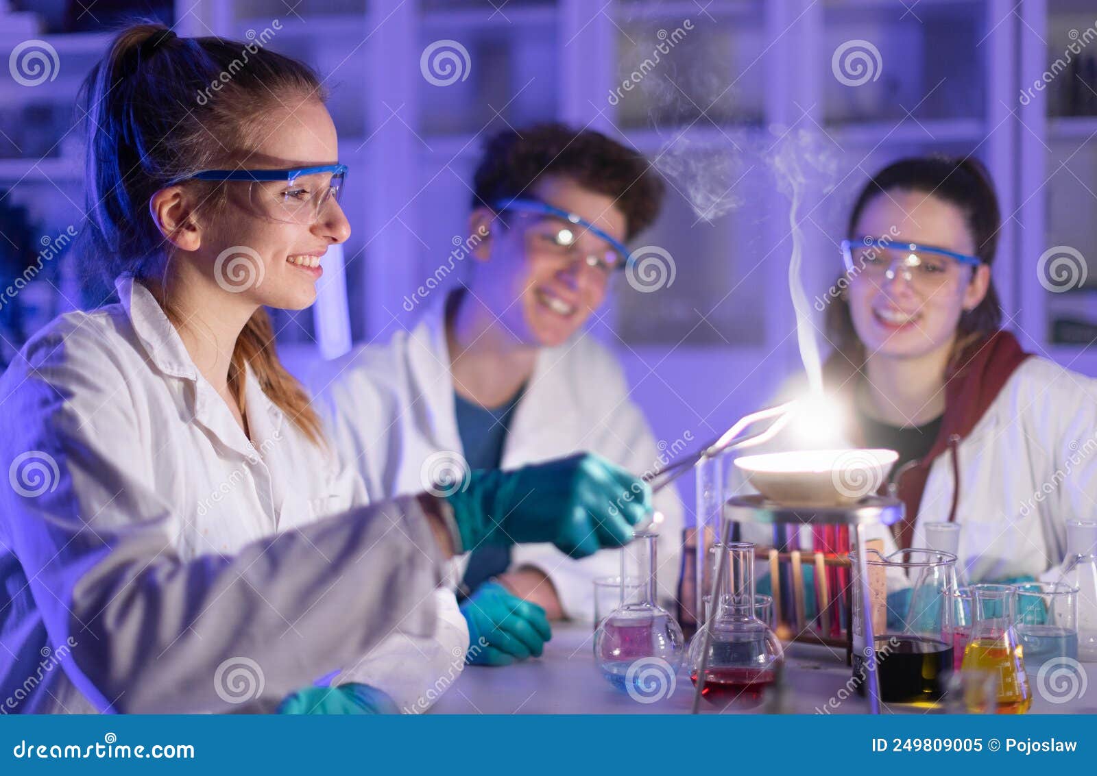 Excited Science Students Doing Chemical Experiment in the Laboratory at ...