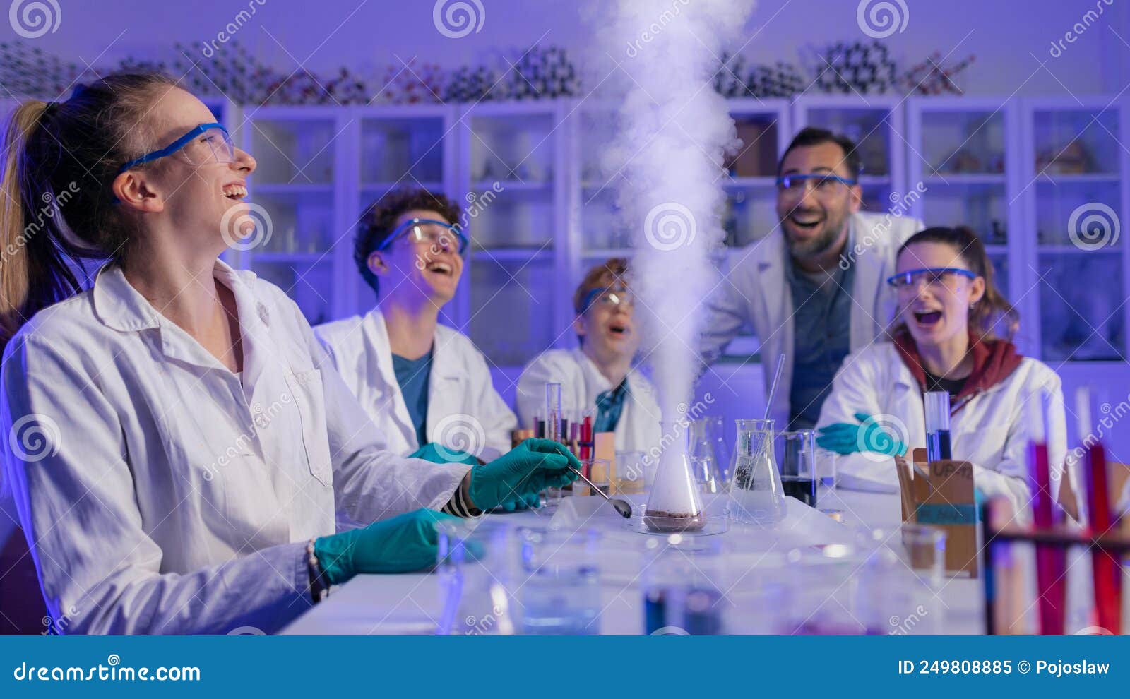 Excited Science Students with Teacher Doing Chemical Experiment in the ...