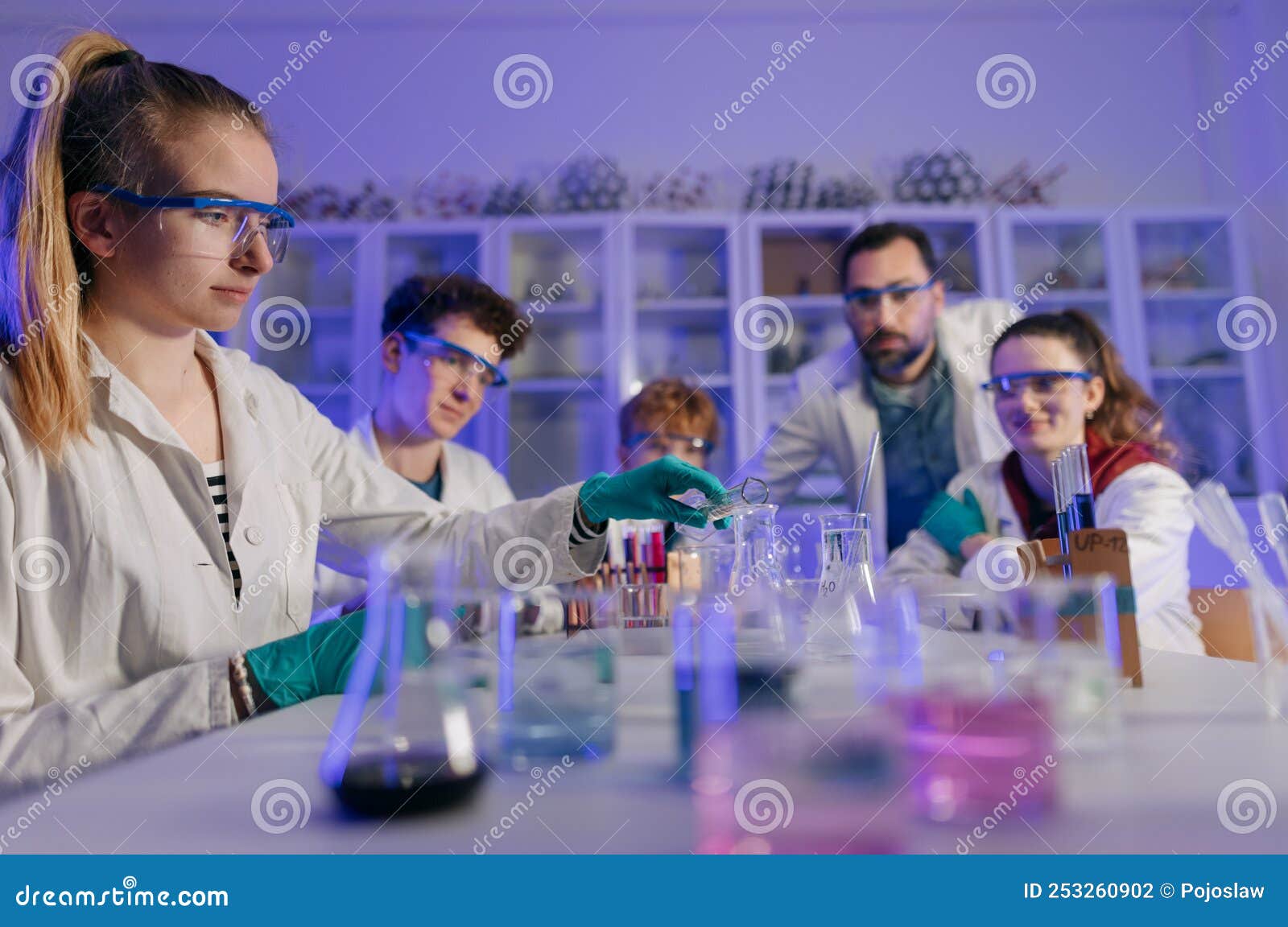 Excited Science Students with Teacher Doing Chemical Experiment in the ...
