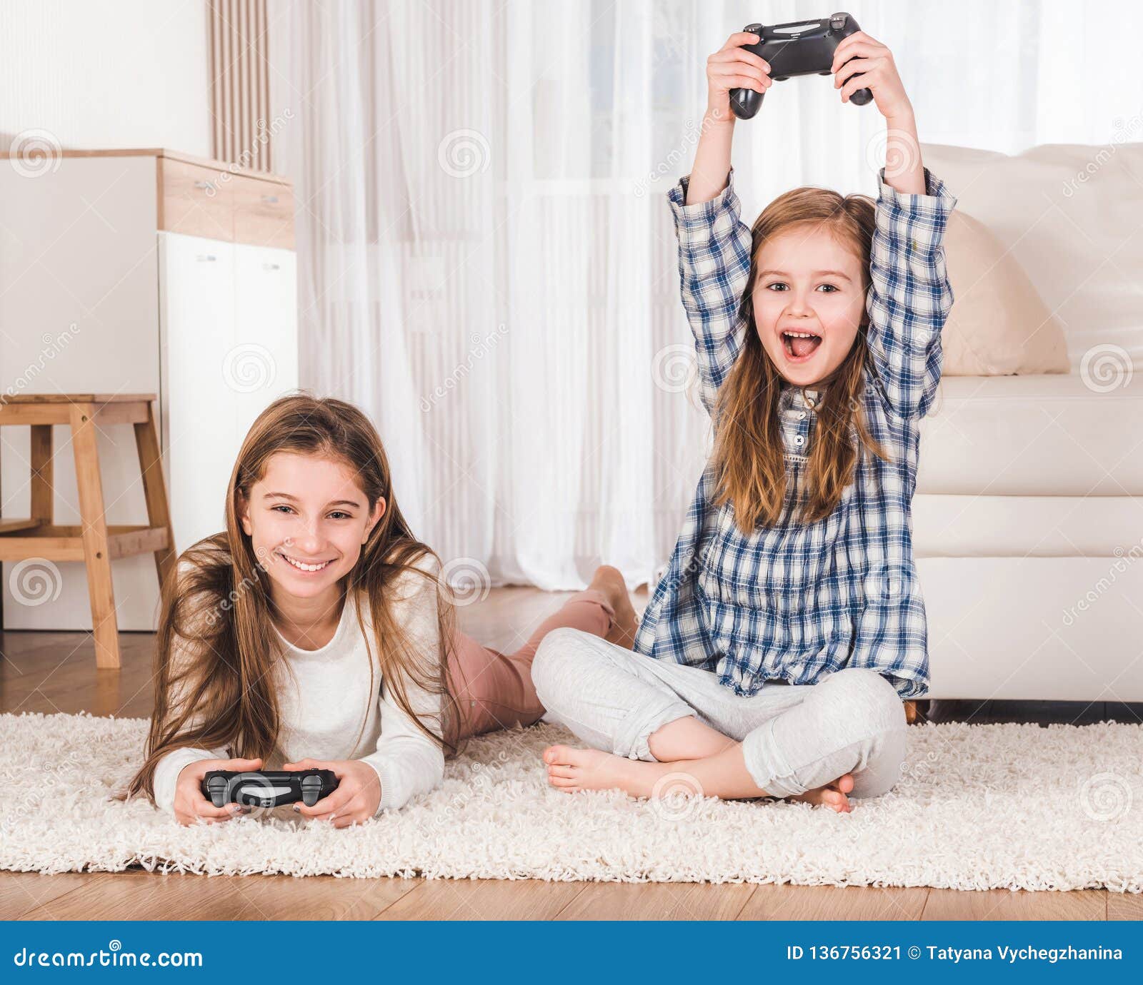 Excited Sisters Playing Games Stock Image - Image of joysticks ...