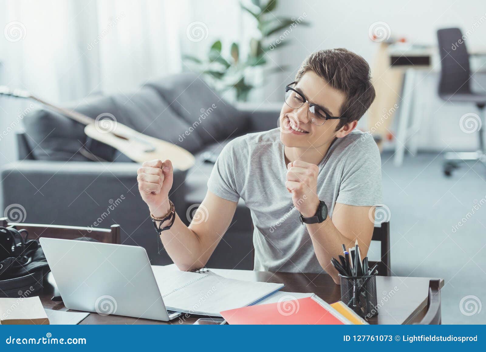 Excited Student with Laptop Doing Homework Stock Image - Image of ...