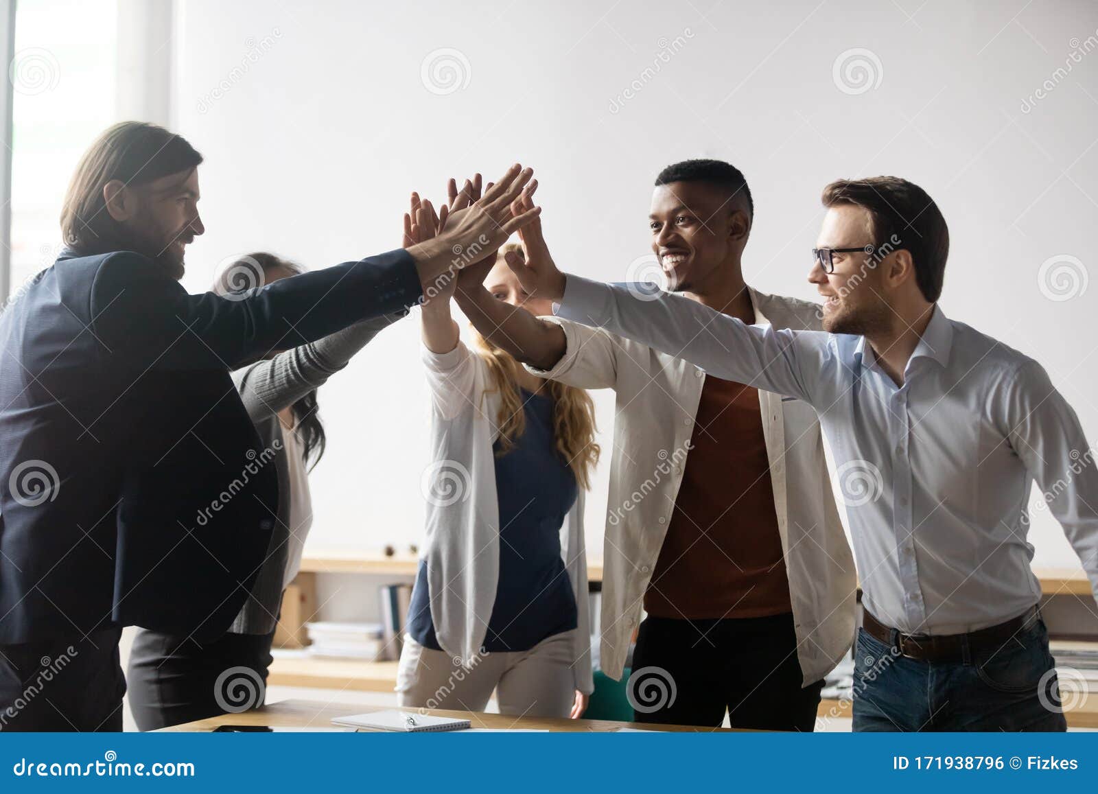 Excited Successful Diverse Business People Giving High Five ... Excited Successful Diverse Business People Giving High Five ...