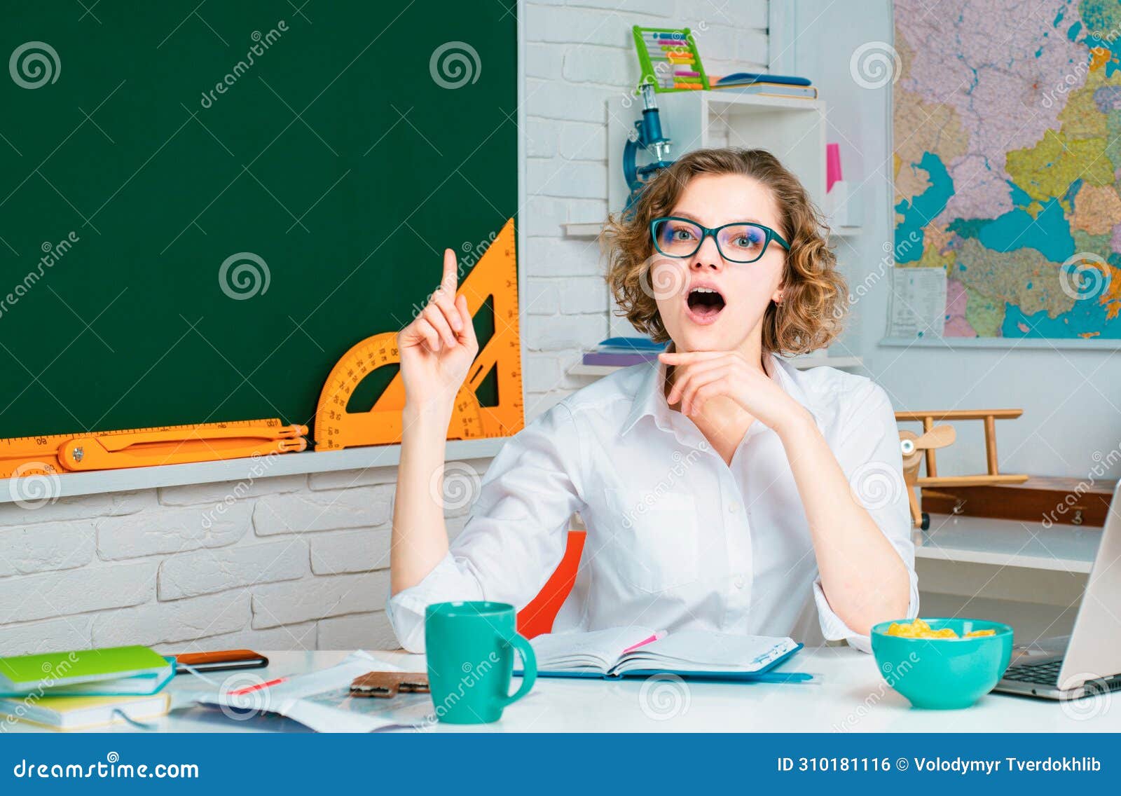 Excited Teacher Have Idea at Classroom in School. Stock Photo - Image ...