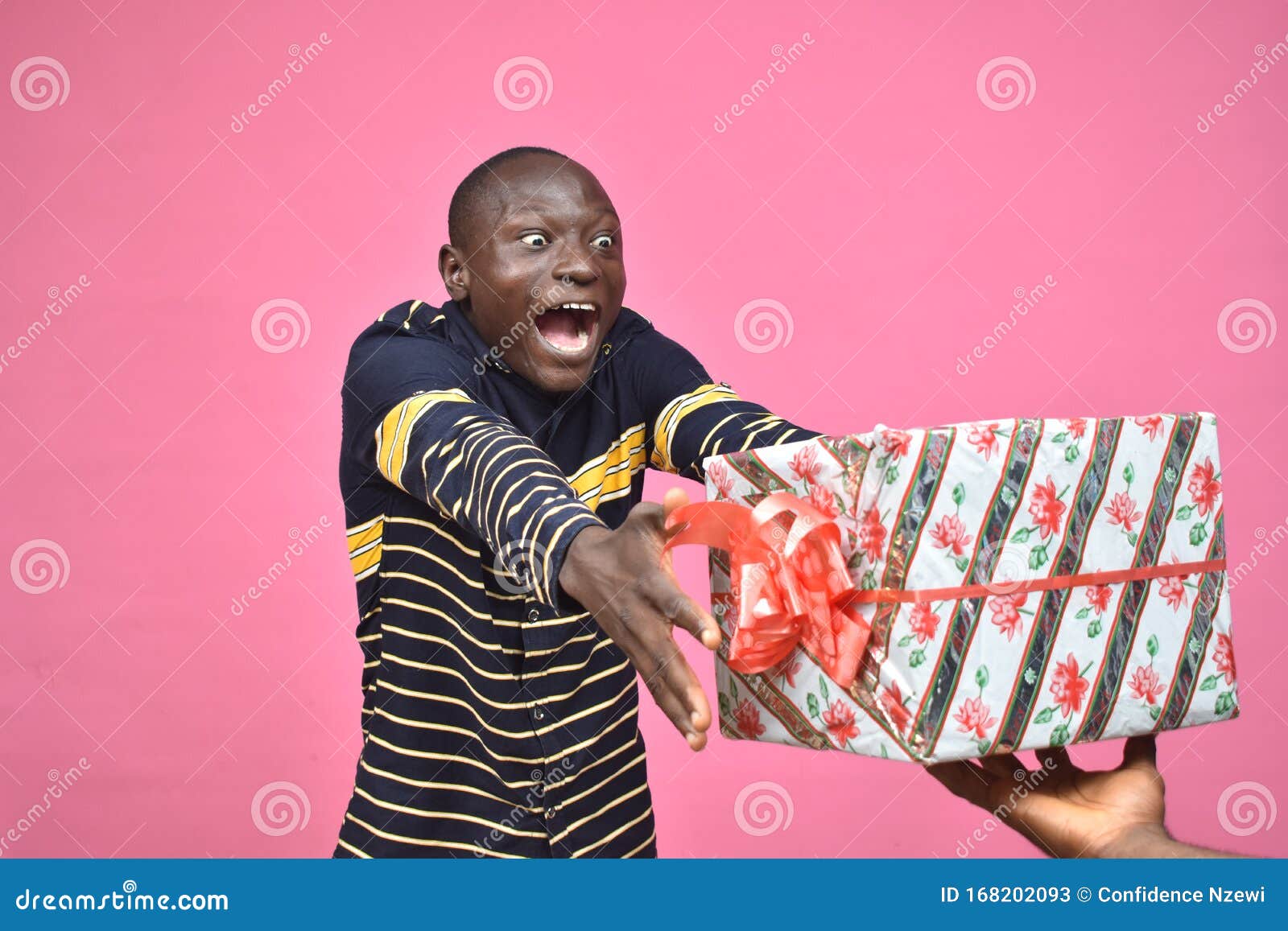 Excited Young Black Man Feeling Super Excited Receiving a Present from ... Excited Young Black Man Feeling Super Excited Receiving a Present from ...