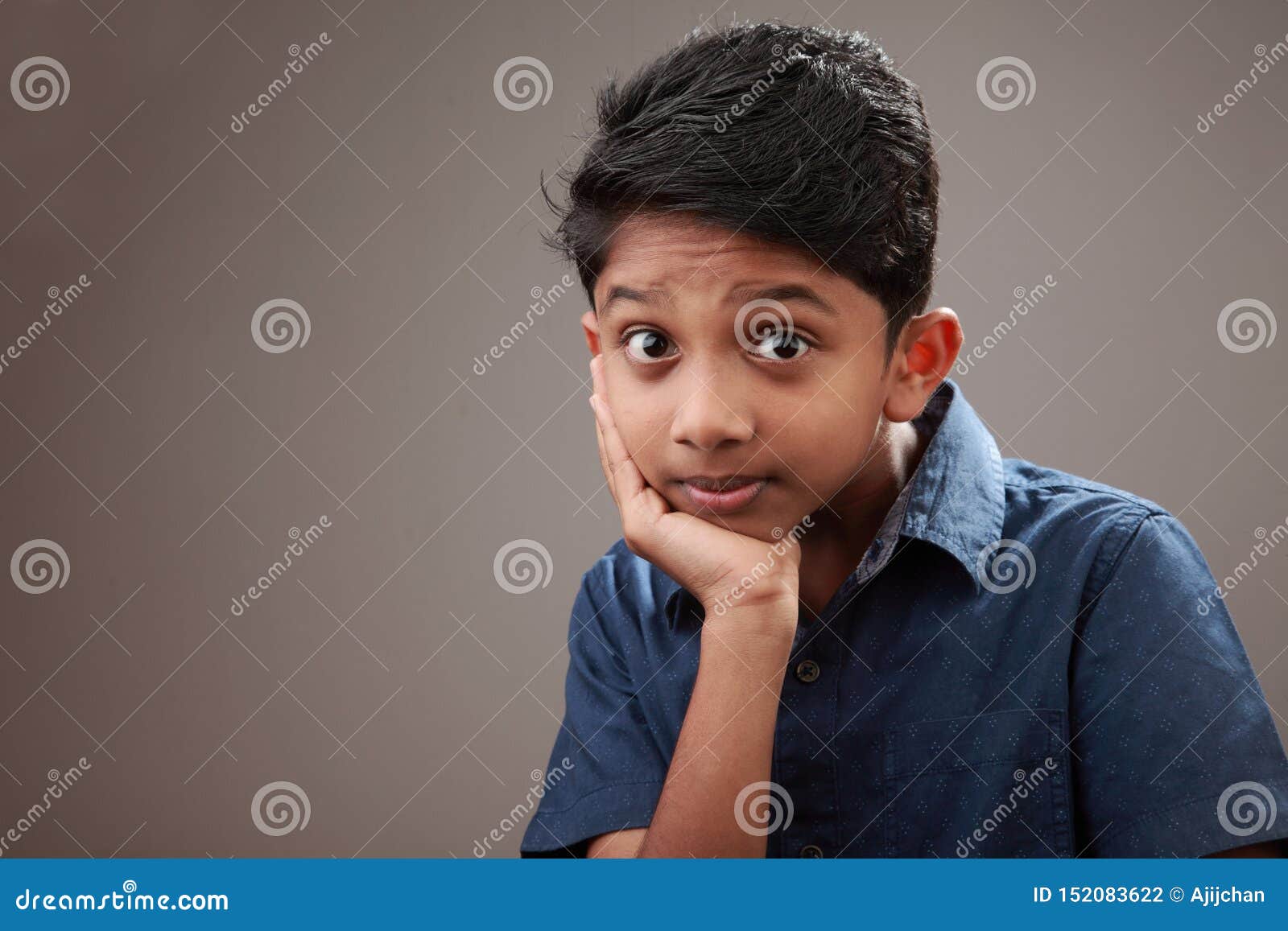 An excited young boy stock photo. Image of shirt, young - 152083622