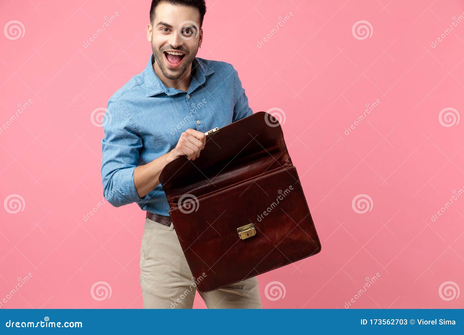 Excited Young Man Laughing and Opening Suitcase Stock Image - Image of ...