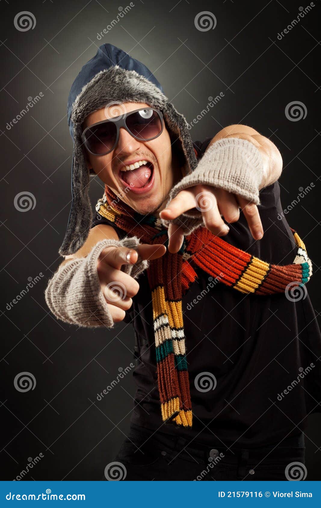 Excited young man pointing stock photo. Image of laugh - 21579116