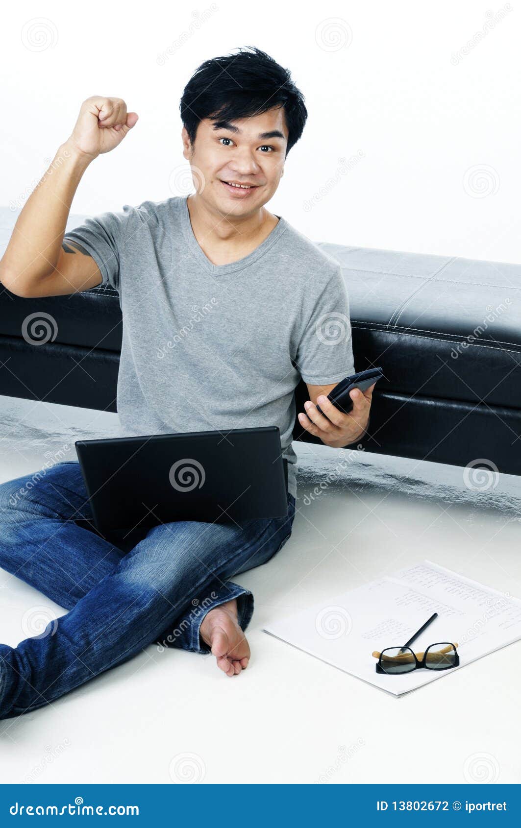 Excited Young Man Sitting on Floor with Laptop Stock Photo - Image of ... Excited Young Man Sitting on Floor with Laptop Stock Photo - Image of ...