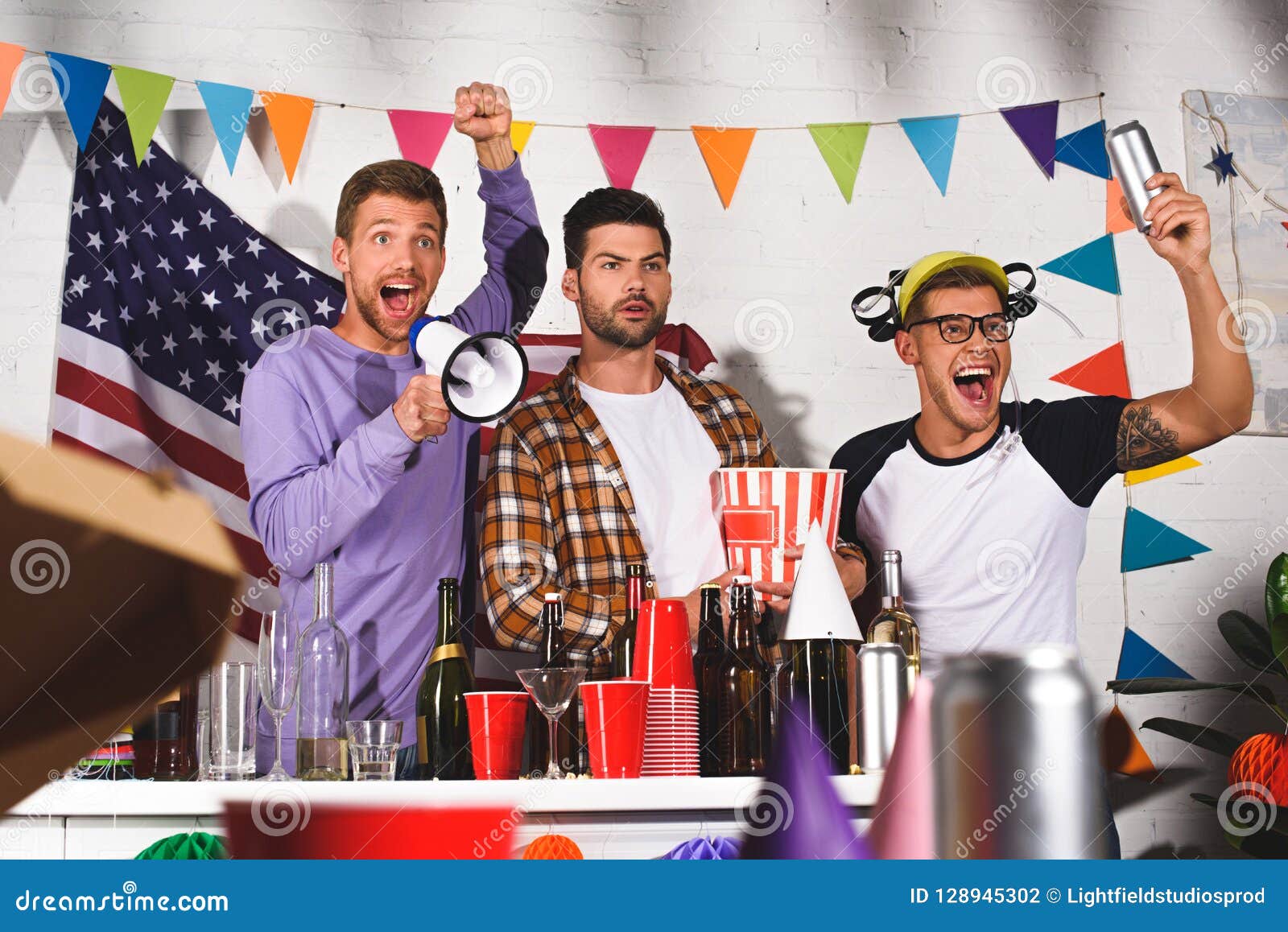 Excited Young Men Screaming and Having Fun while Partying Stock Photo ...