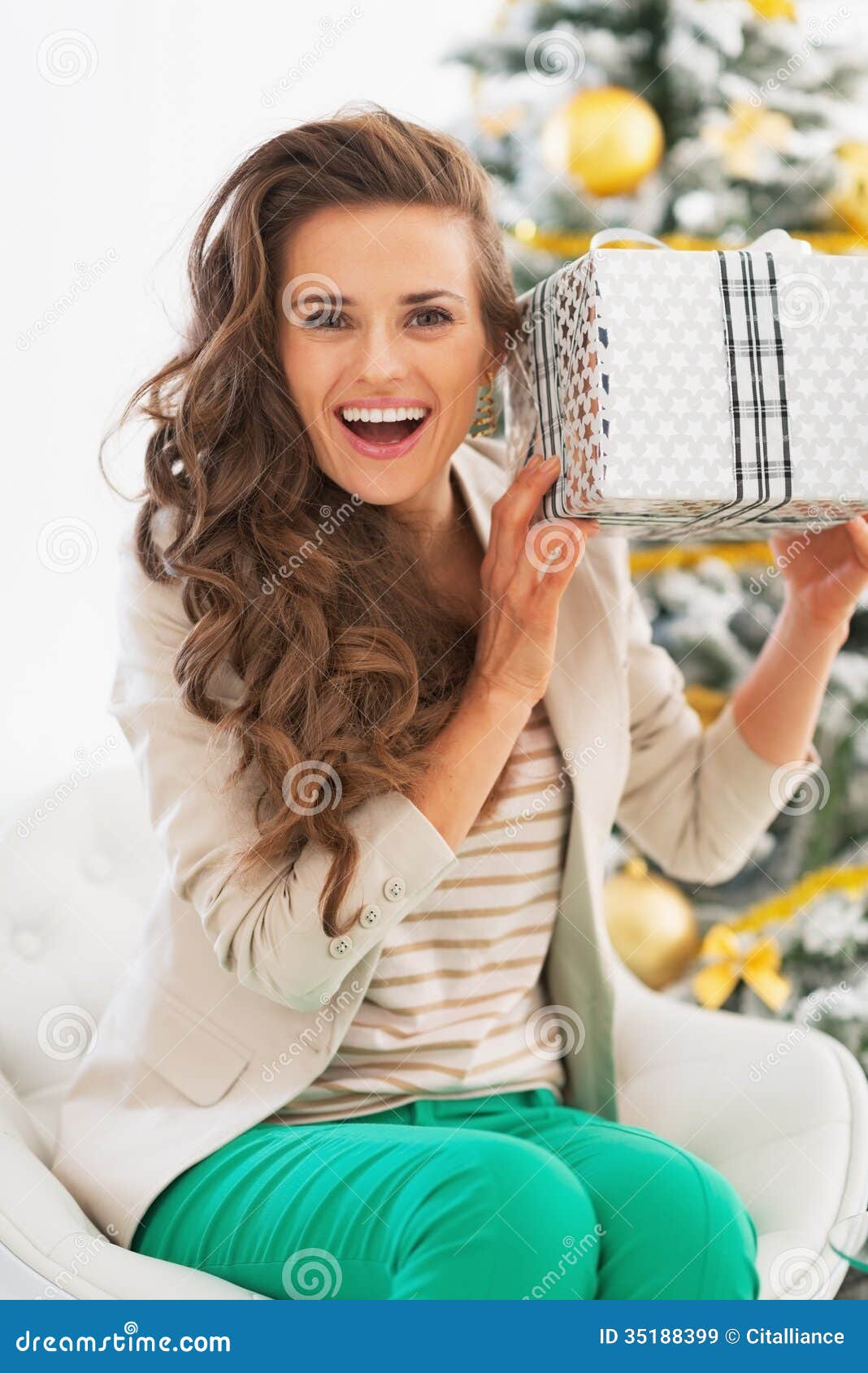 Excited Young Woman with Christmas Shaking Present Box Stock Image ...