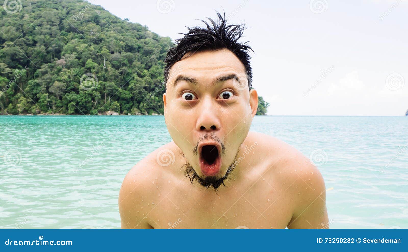 Exciting man on the beach. stock photo. Image of active - 73250282