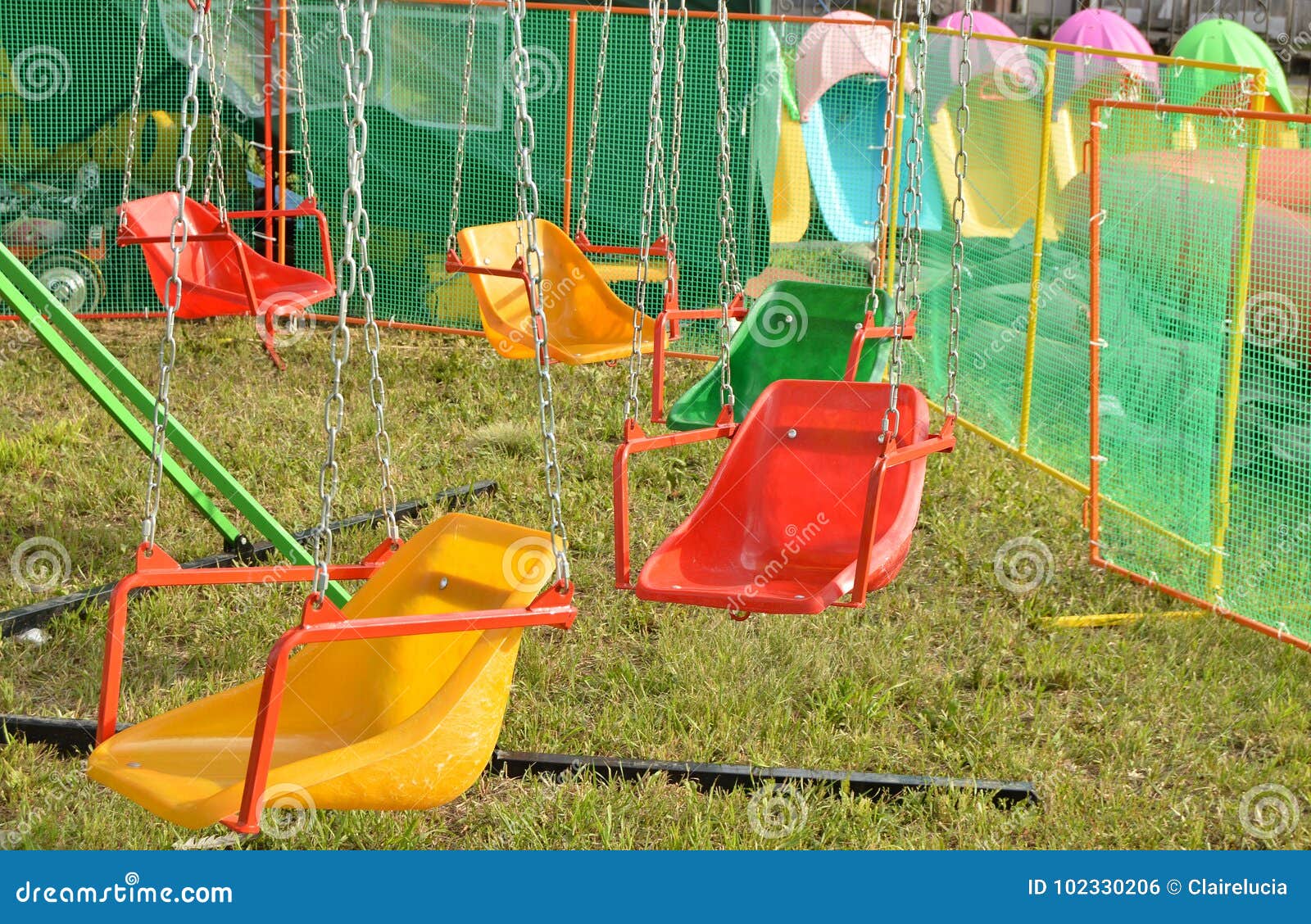 Exciting Rides for Children - Swings, Roundabout on the Chains Stock ...