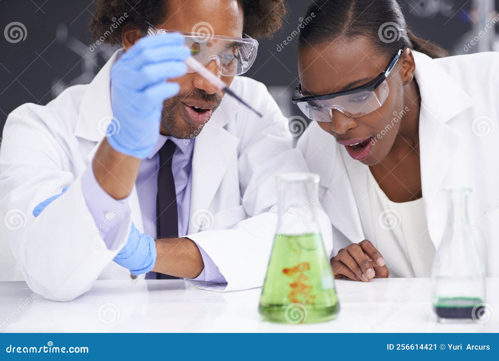 Exciting Stuff, Man. Two Scientists Conducting an Experiment with ...