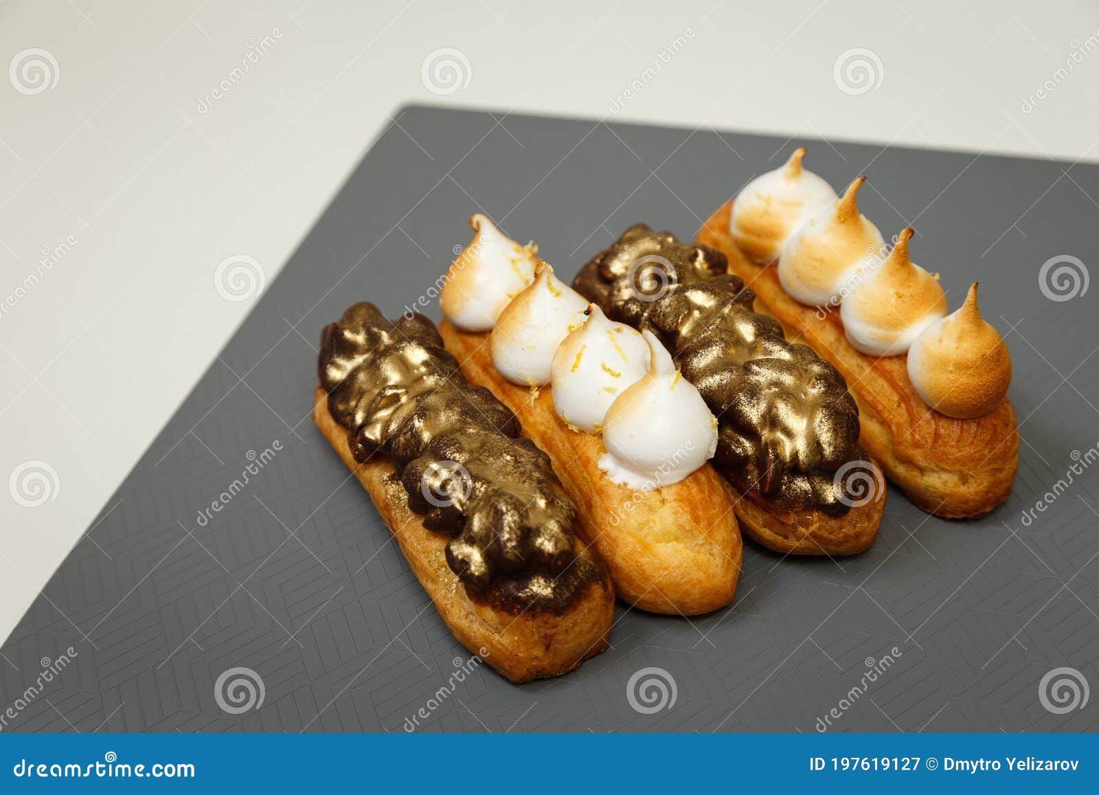 Exciting View of Delicious Eclairs Stock Image - Image of batch, dessert: 197619127