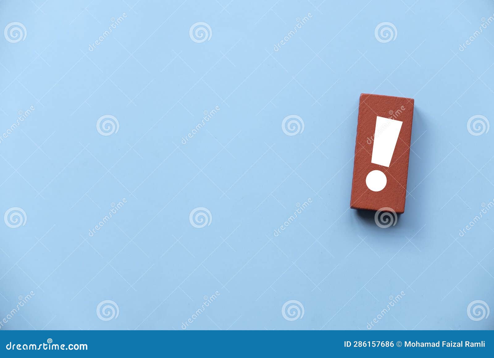 Exclamation Mark on Red Wooden Rectangular Isolated on Blue Background ...