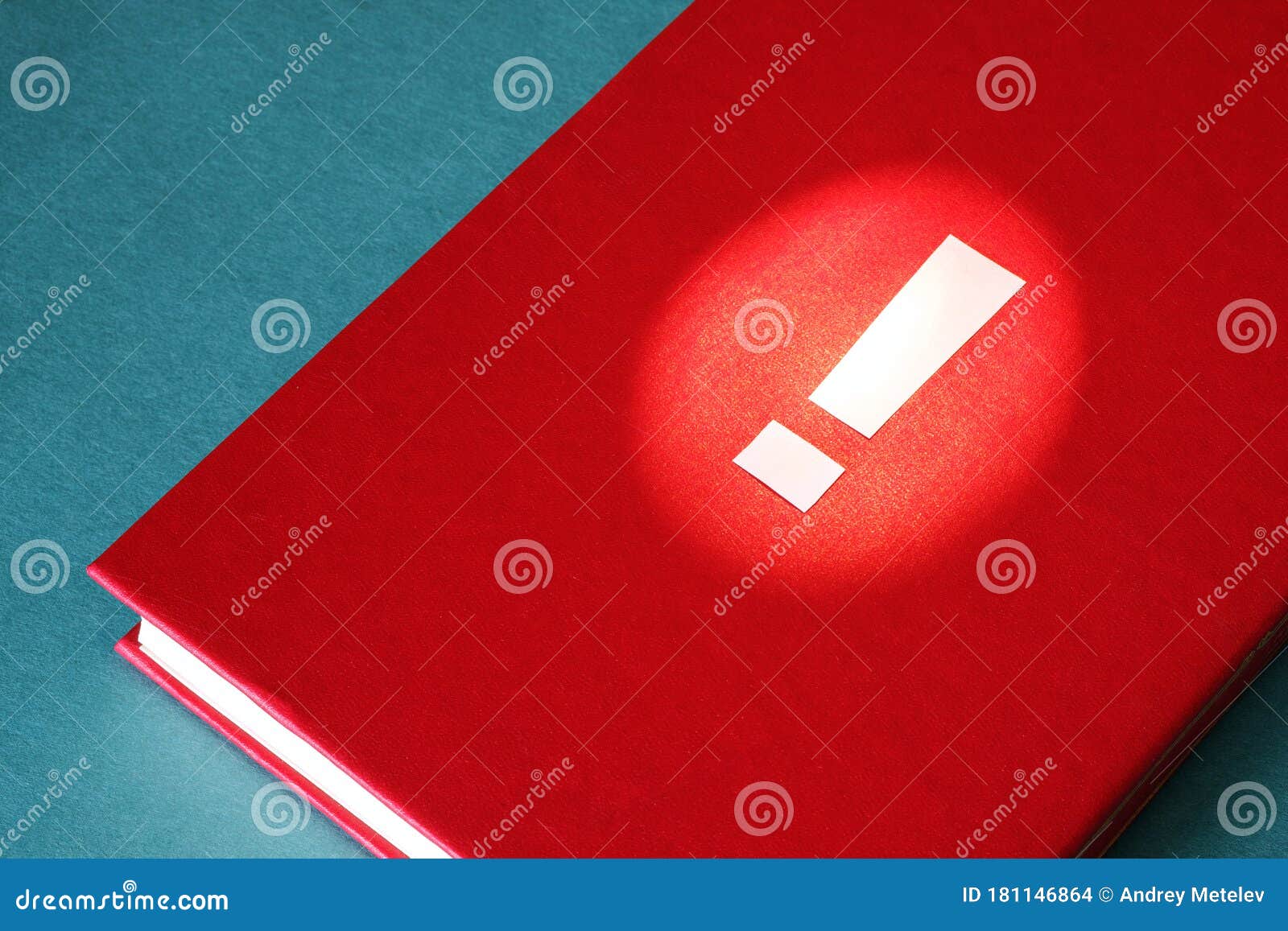 An Exclamation Point Cut Out of Paper is on the Red Book Stock Photo ...