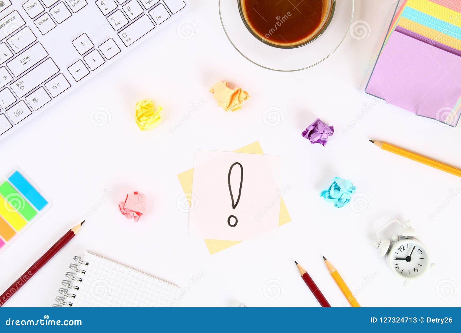 An Exclamation Point on the Sticker is a Note on a White Desktop Next ...