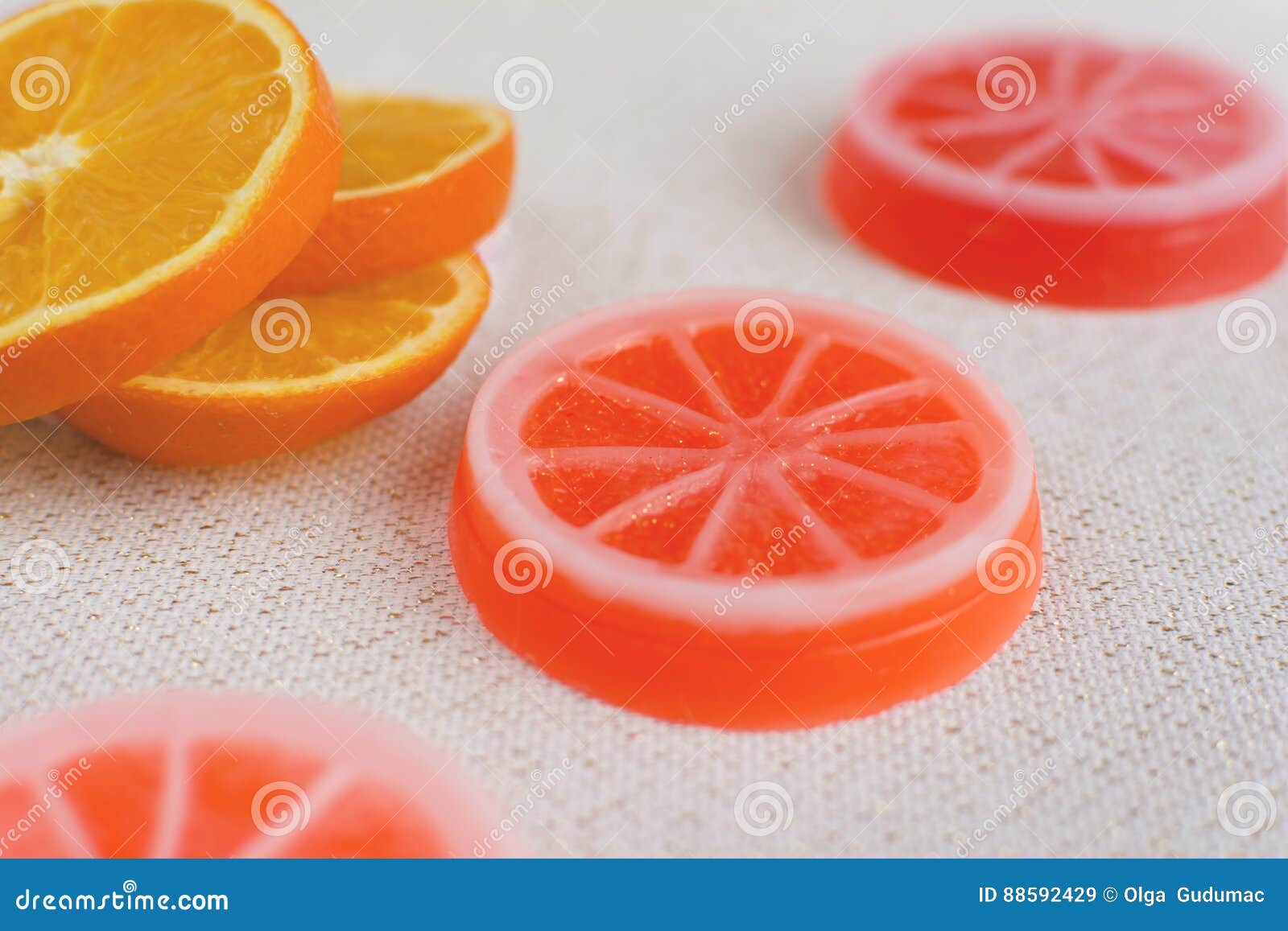 Exclusive Orange Handmade Soaps. Fresh Orange Slices on the Back Stock ...