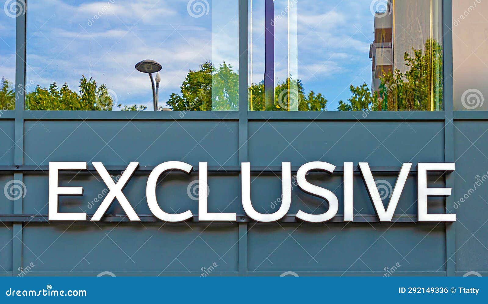 Exclusive Sign on a Building Facade Stock Photo - Image of sign, street ...