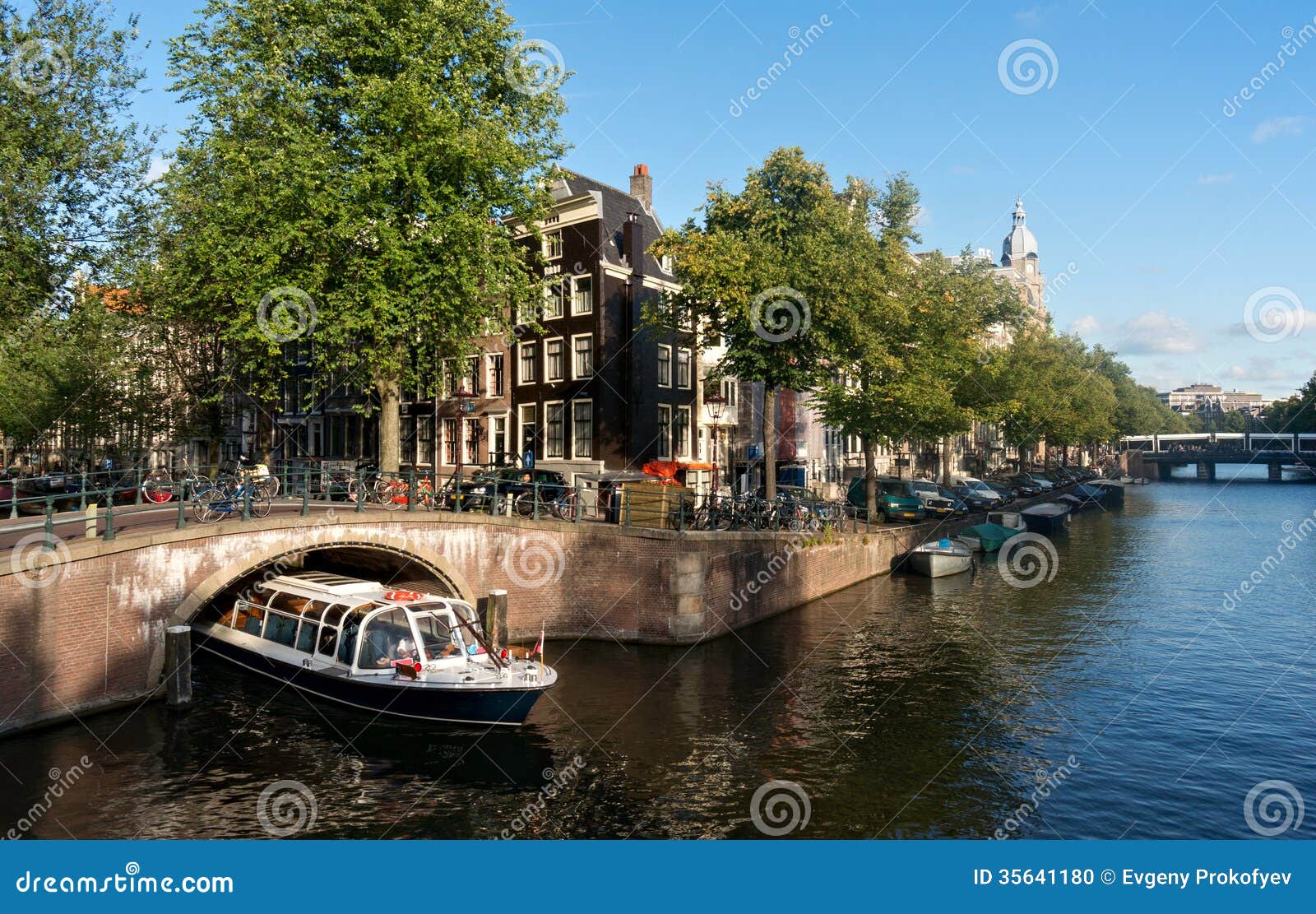 Excursion Boat in Amsterdam Canal Stock Photo - Image of dutch ...