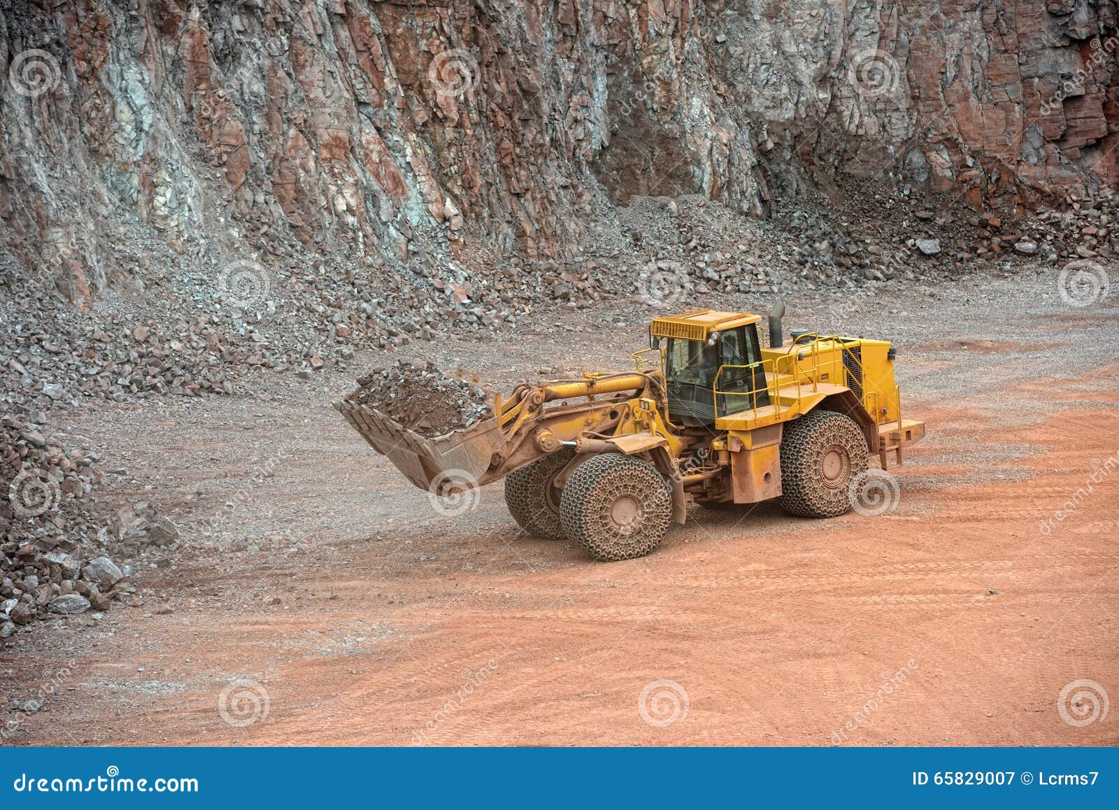 Excuvator Loading Stones in a Quarry Stock Image - Image of earth ...