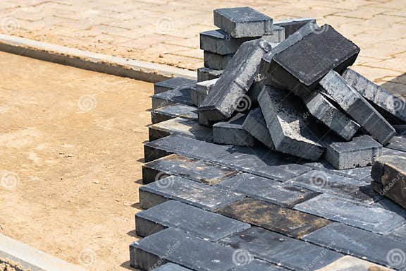 Execution of the Paving Stone Surface and Leveling. Stock Image - Image ...