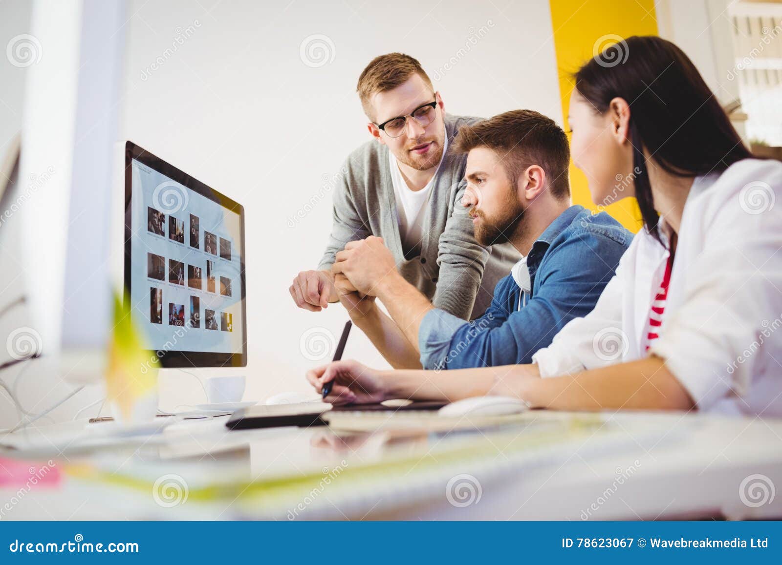 Executive Assisting Colleagues at Creative Office Stock Image - Image ...