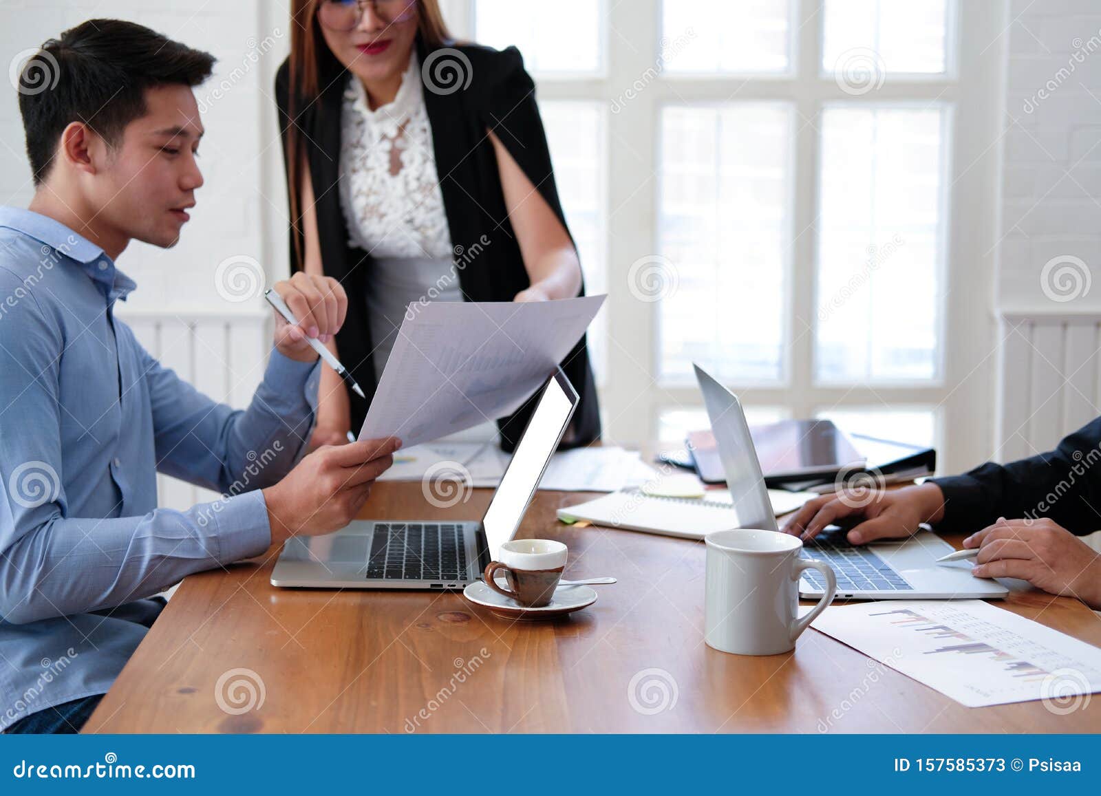Businesswoman Analyzing Discussing Business Project with Colleague ... Businesswoman Analyzing Discussing Business Project with Colleague ...