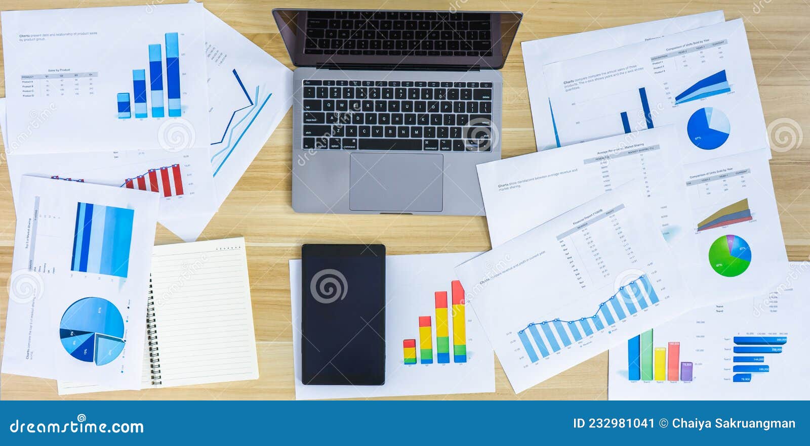 Executive Data Graph on Document, Laptop, Tablet, Notebook on Desk ...