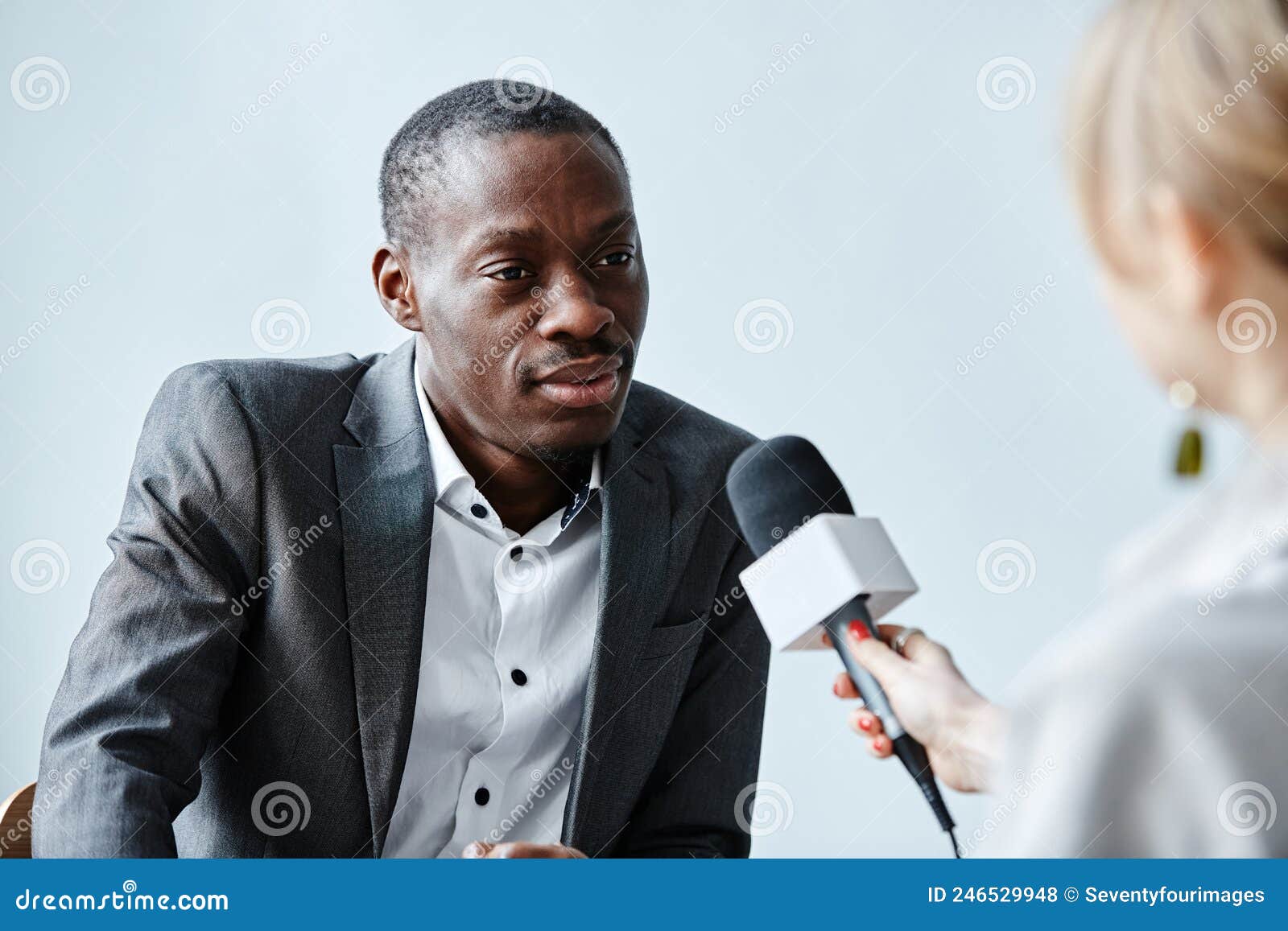 Executive Giving Interview stock photo. Image of communication - 246529948