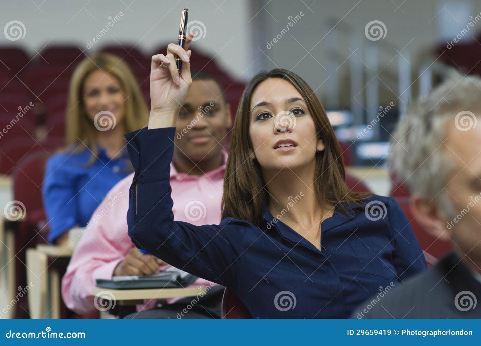 Executive Raises Hand during a Lecture Stock Image - Image of asian ...