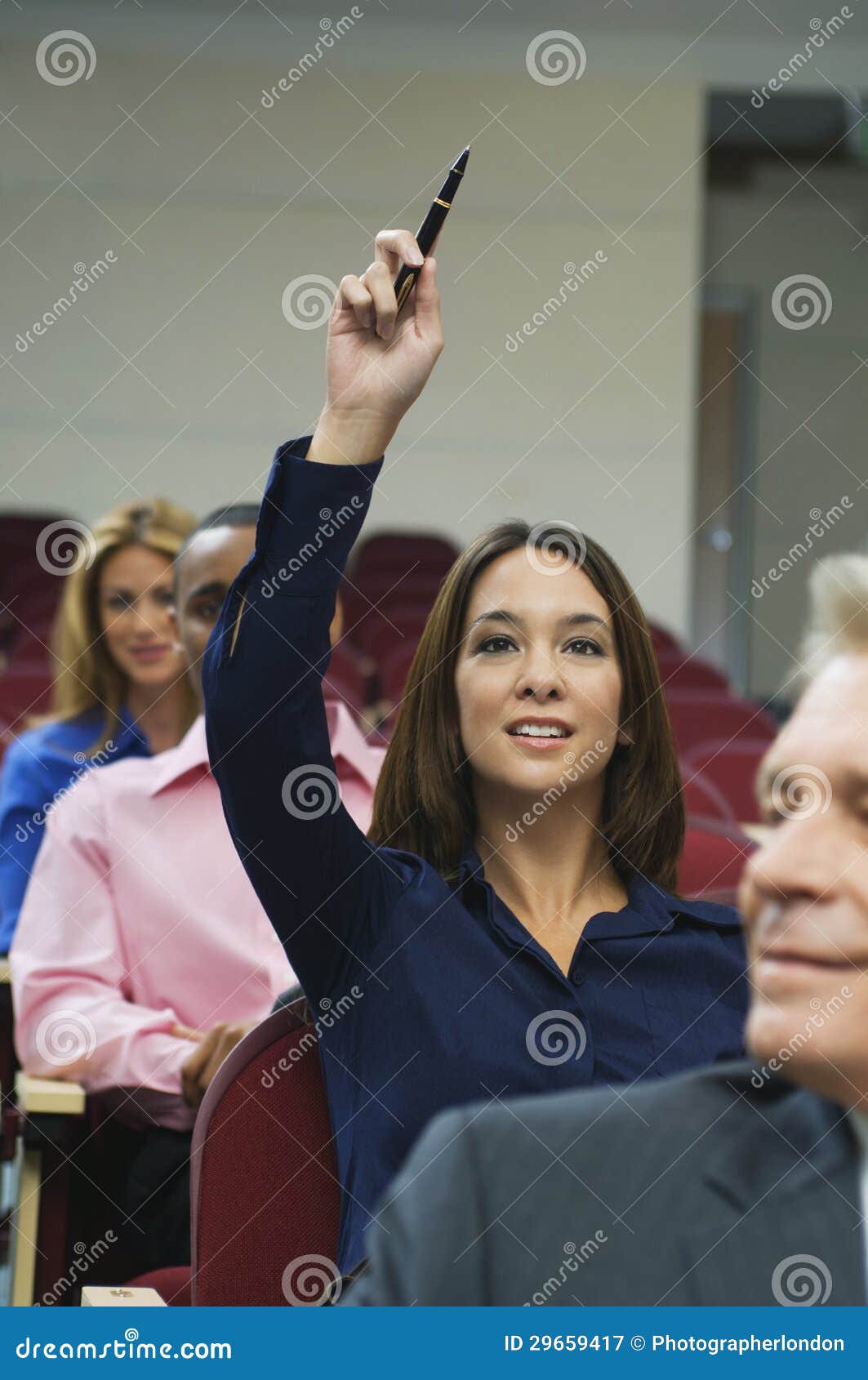 Executive Raises Hand during a Seminar Stock Image - Image of ...