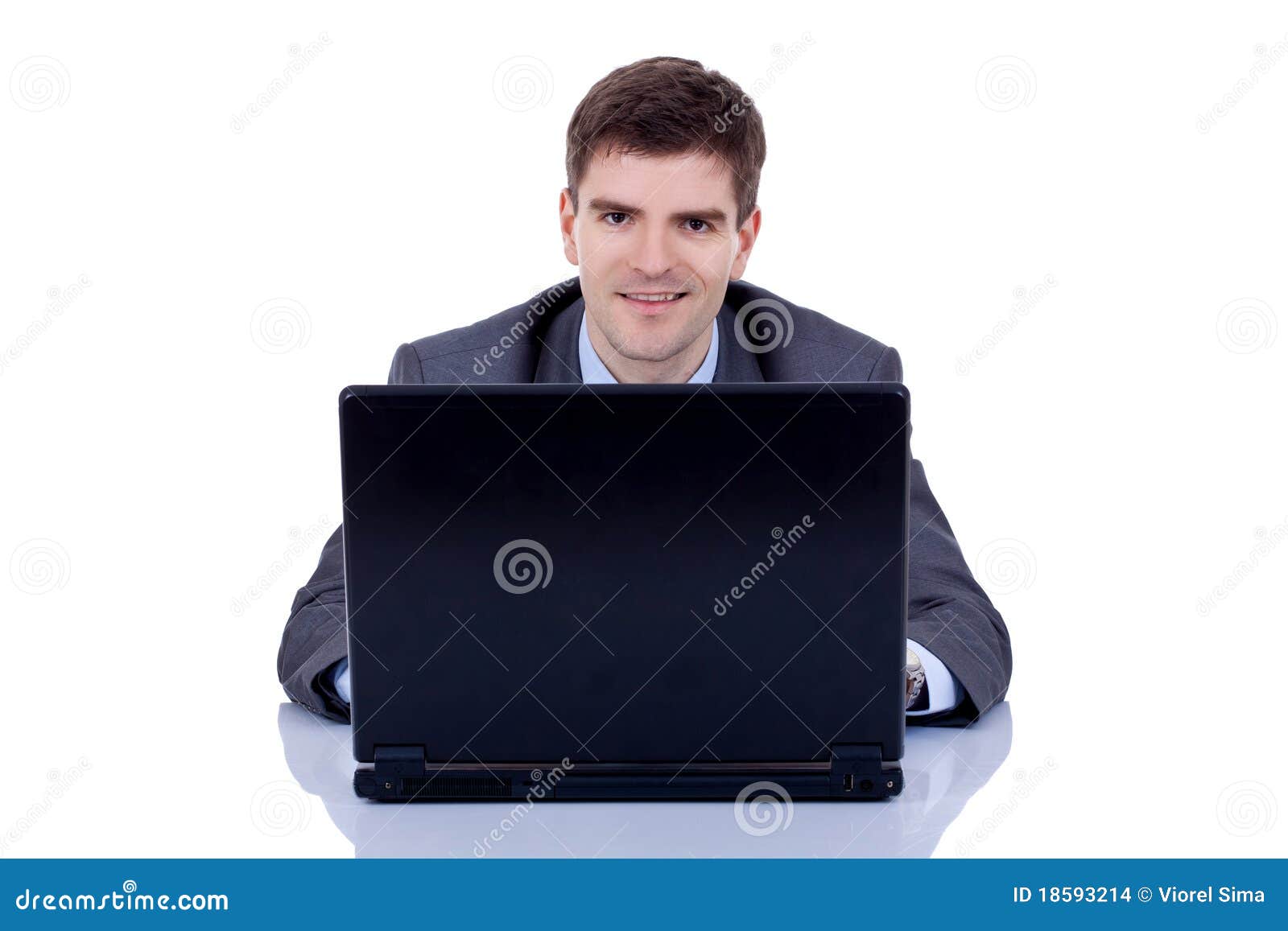 Executive in Suit Behind Desk with Laptop Stock Photo - Image of color ...