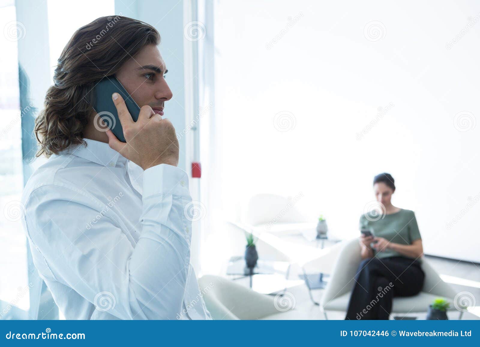 Executive Talking on the Phone Stock Photo - Image of indoors, male ...