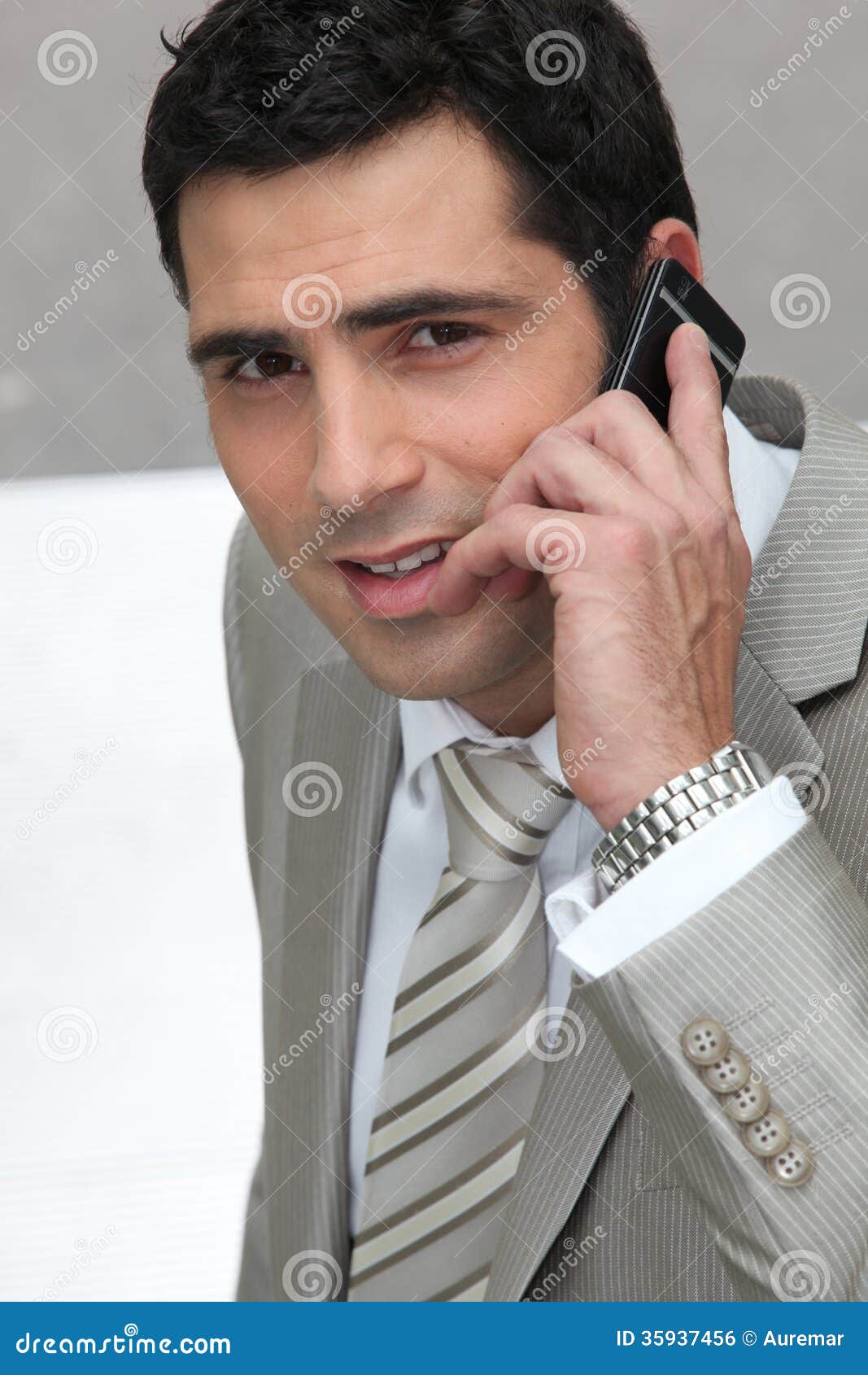Executive Using a Cellphone Stock Photo - Image of looking, high: 35937456