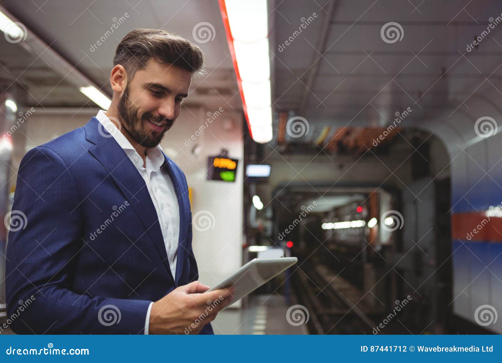 Executive Using Digital Tablet on Platform Stock Photo - Image of ...