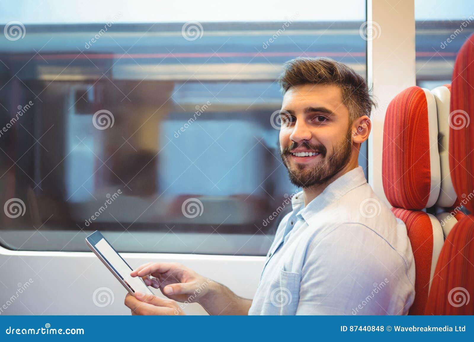 Executive Using Digital Tablet Travelling in Train Stock Photo - Image ...