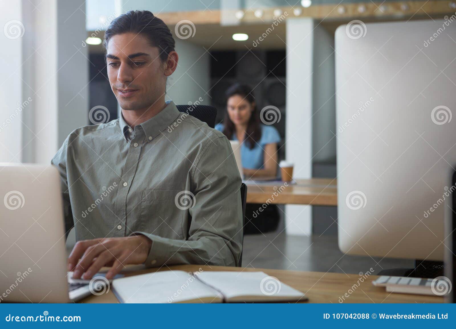 Executive Working on Laptop at Desk Stock Photo - Image of executive ...
