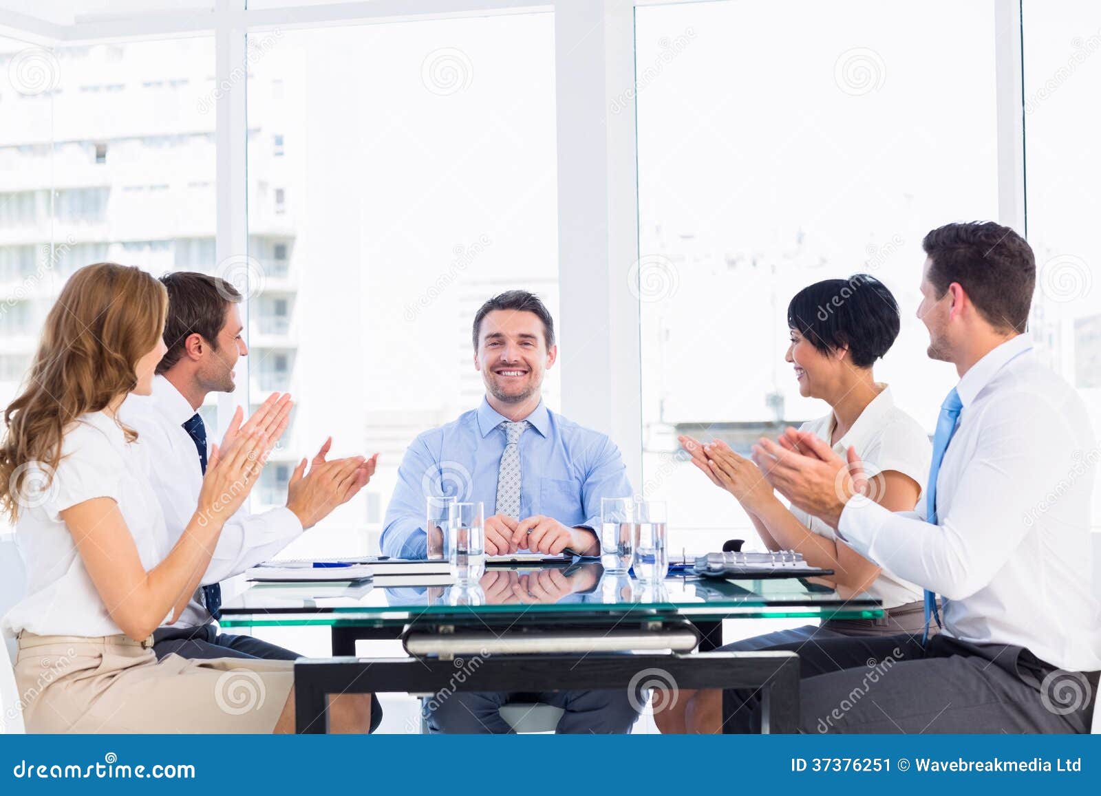 Executives Clapping Around Conference Table Stock Image - Image of ...