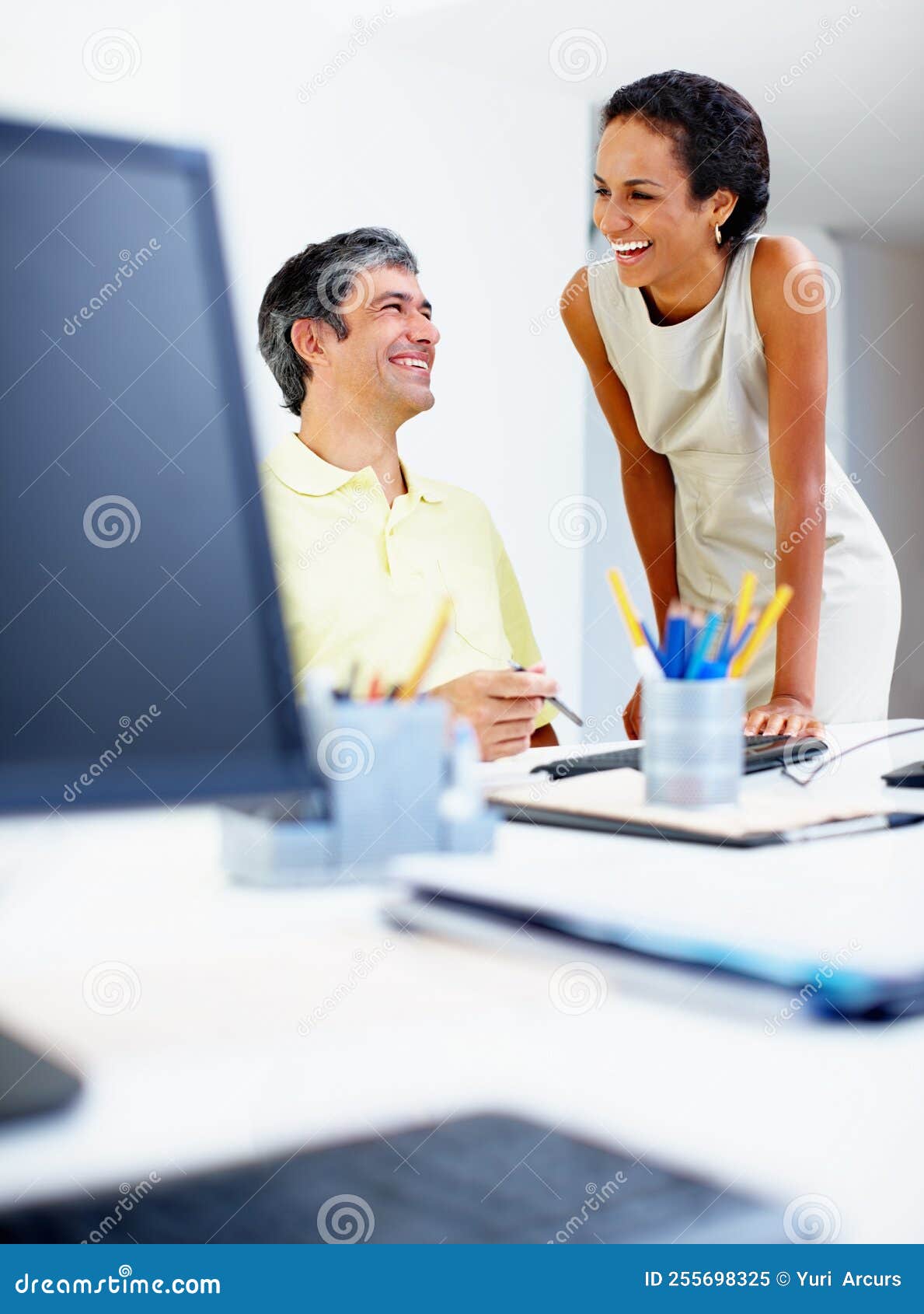 Executives Enjoying Work. Two Casually Dressed Business People Enjoying ...