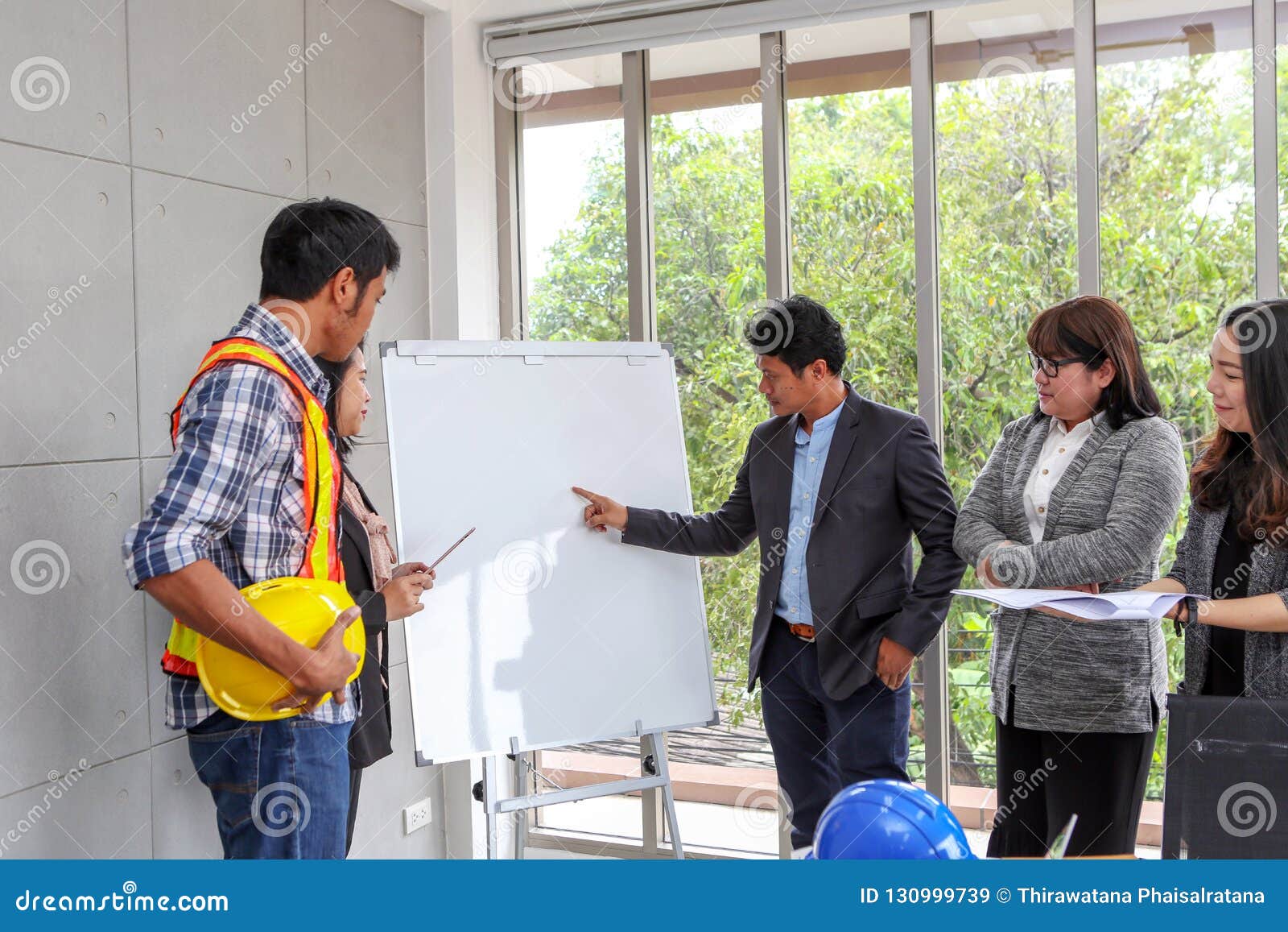 Executives are Explaining Plans on a Whiteboard. Confident Boss Stock ...