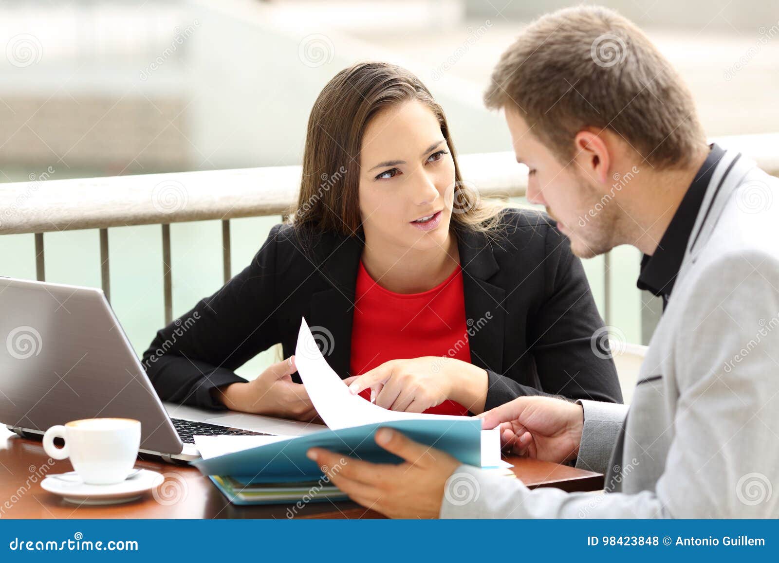Executives Having a Business Conversation in a Bar Stock Photo - Image ...