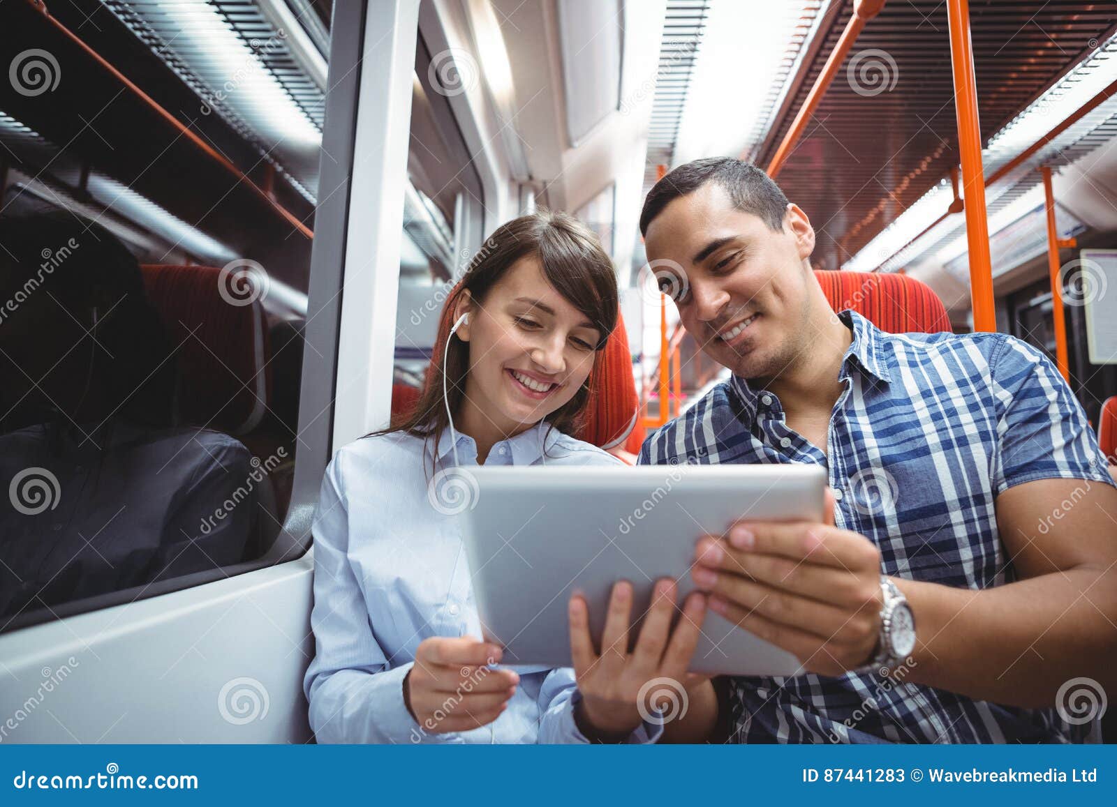 Executives Using Digital Tablet Travelling in Train Stock Image - Image ...