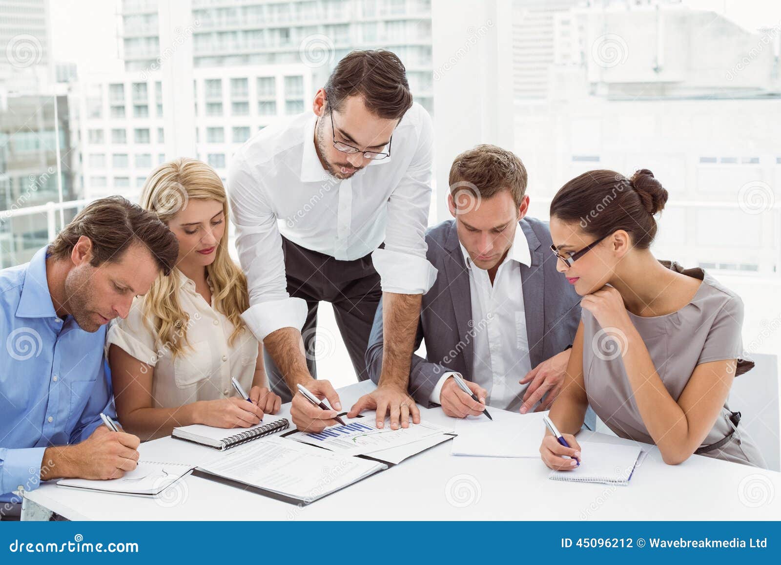 Executives Writing Notes in Office Stock Photo - Image of executives ...