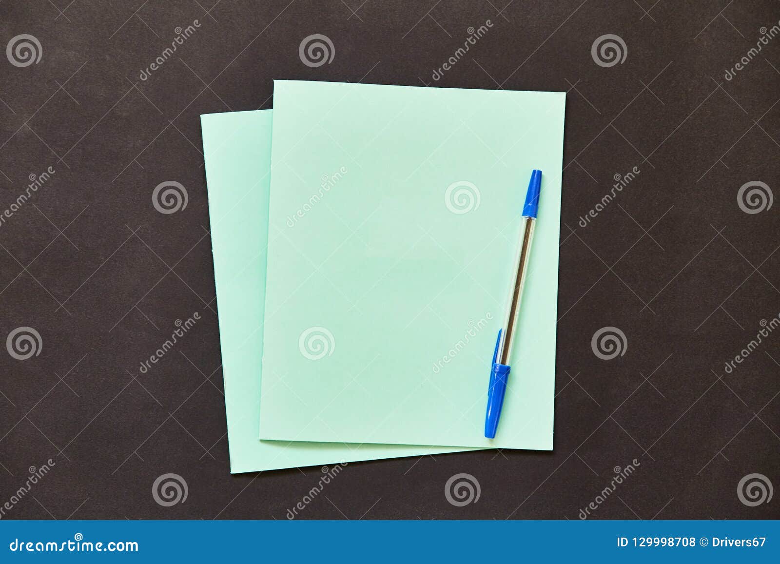 Exercise book with pencil. stock photo. Image of design - 129998708