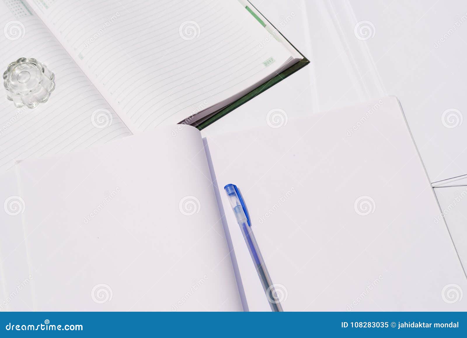 White Exercise Book with a Blue Pen. Stock Image - Image of schoolwork ...